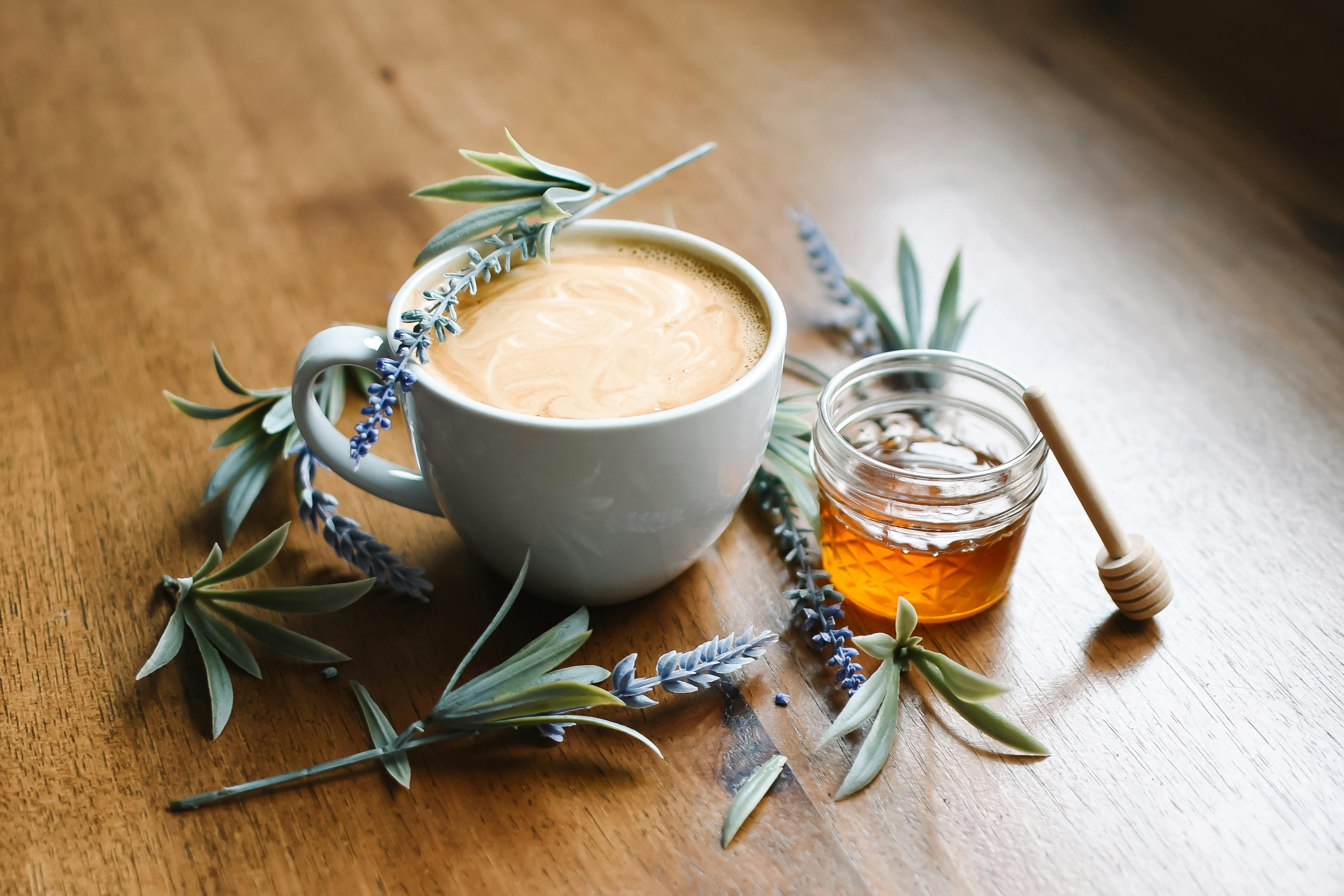 Grayscale Photo of a Cup of Coffee · Free Stock Photo