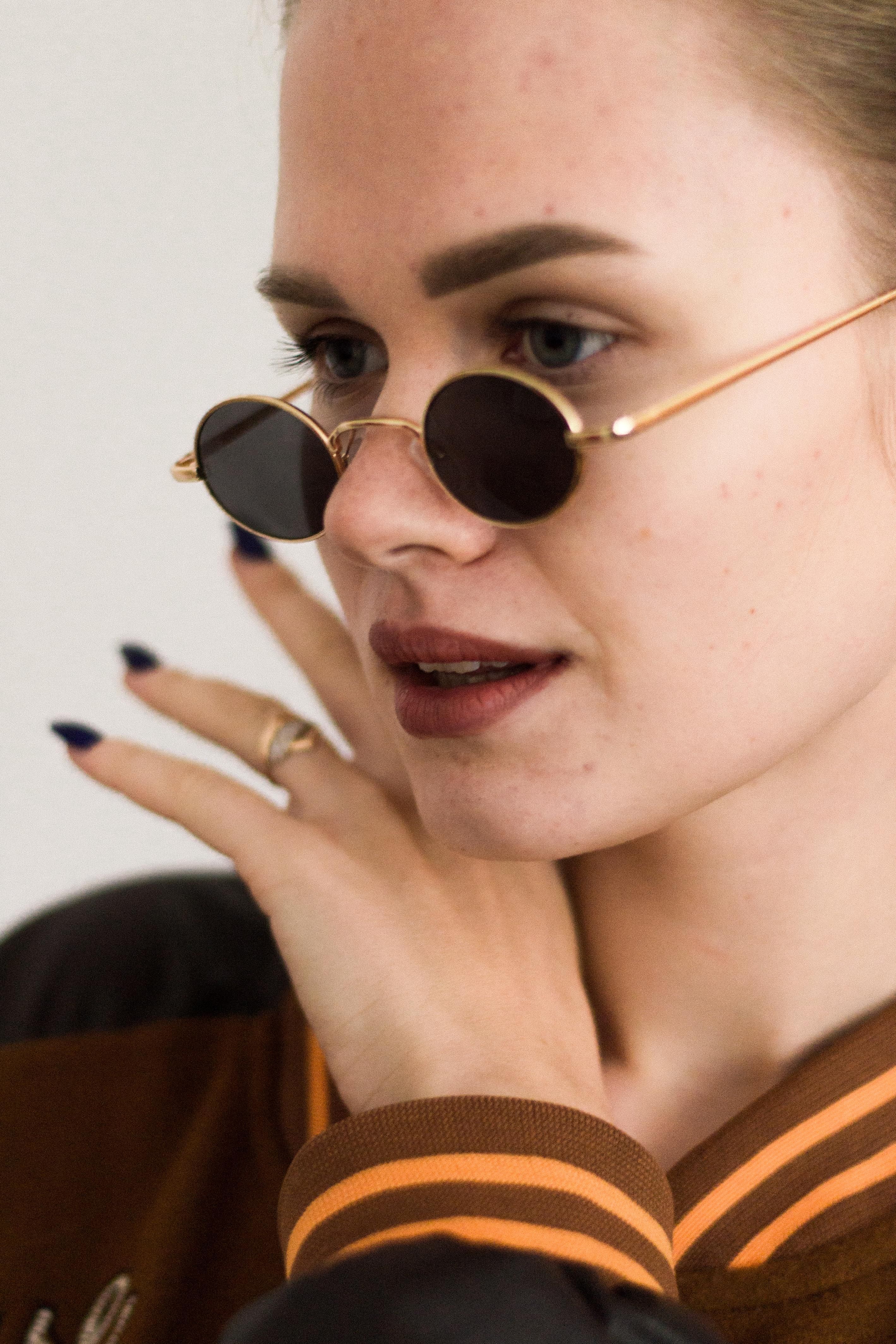 Close Up Photo of Woman with Her Hand on Her Face · Free Stock Photo