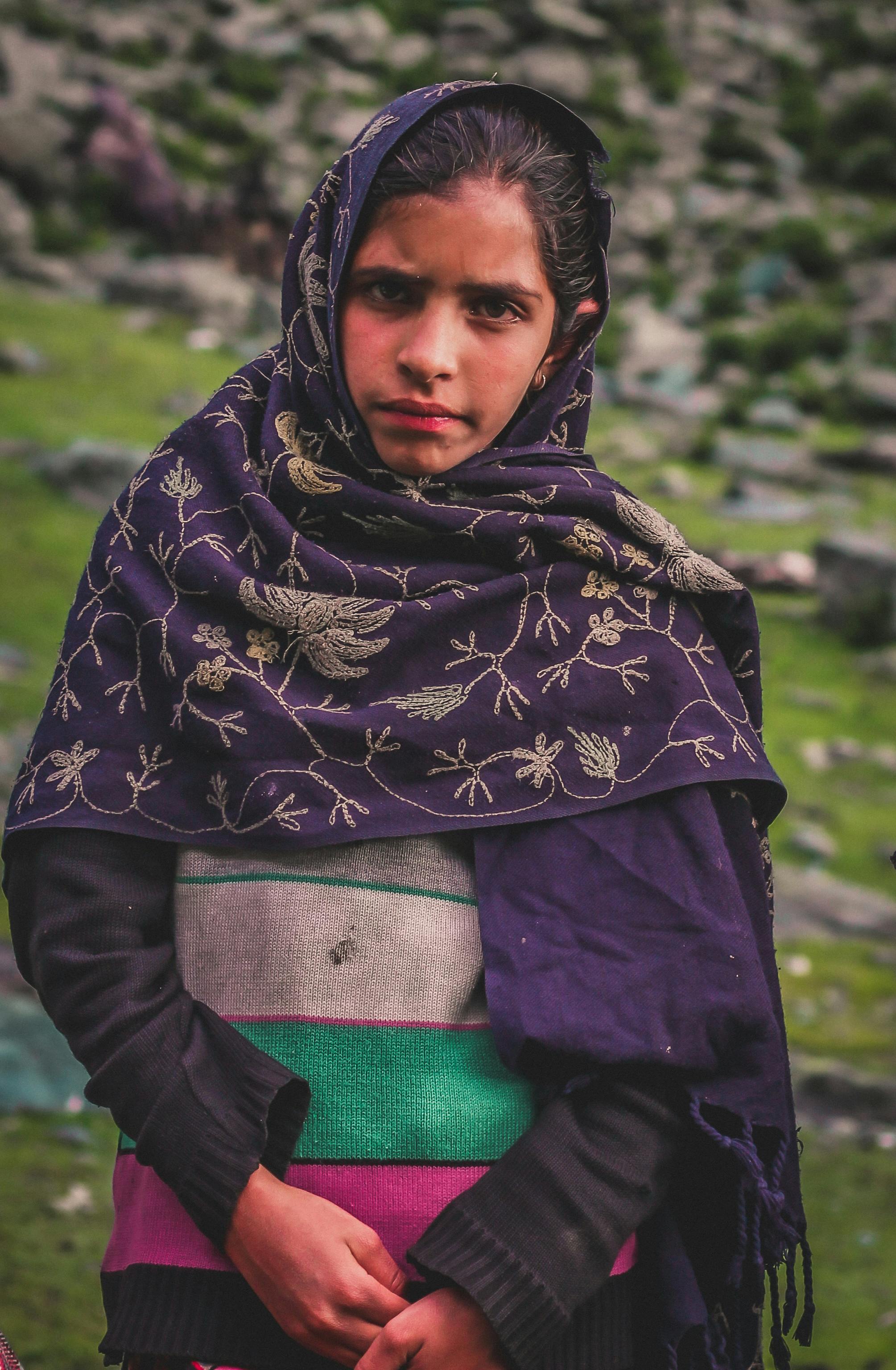 Women in Hijab and Face Masks Hugging Each Other · Free Stock Photo