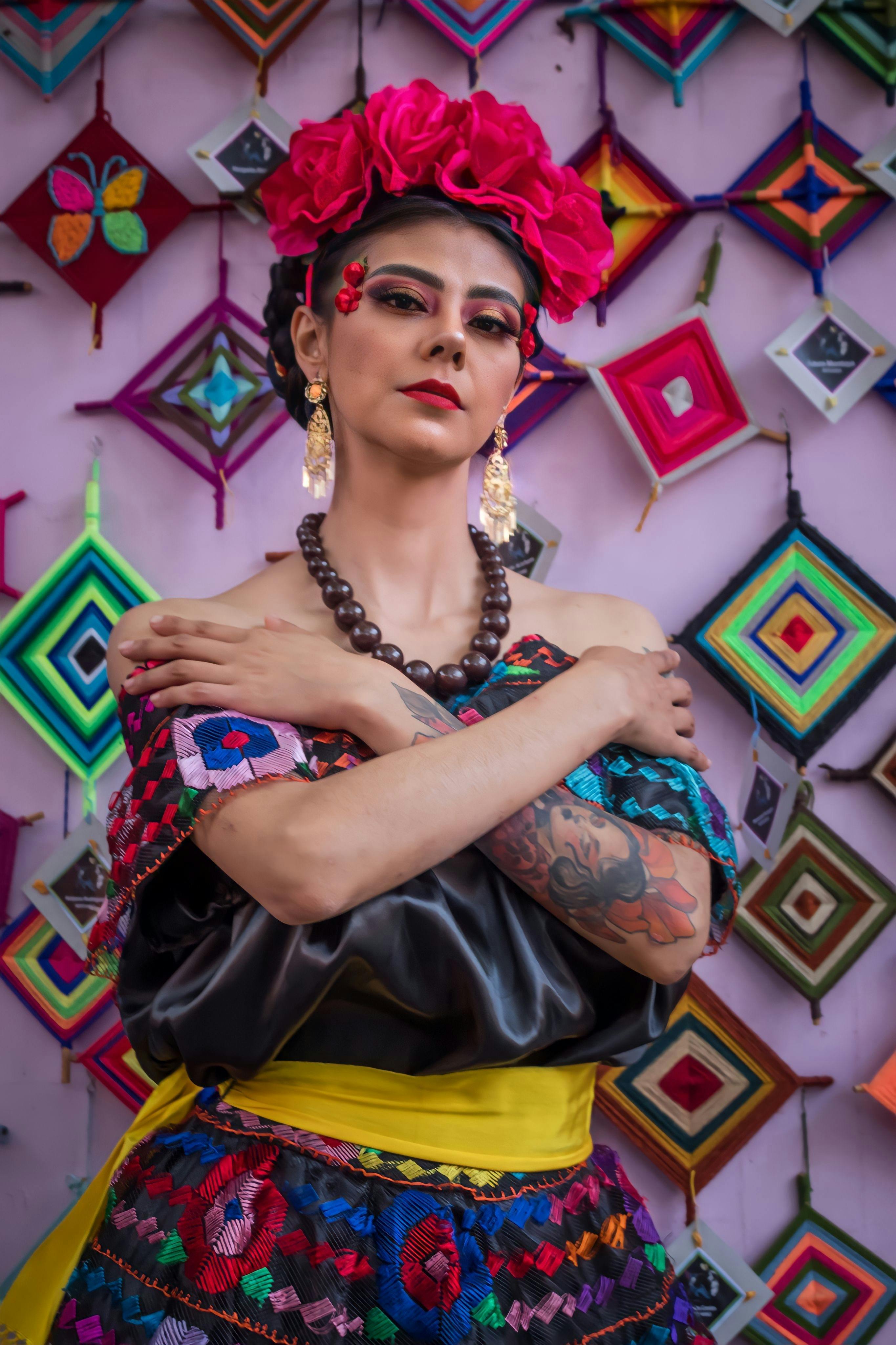 Woman in Traditional Dress Wading in Sea · Free Stock Photo