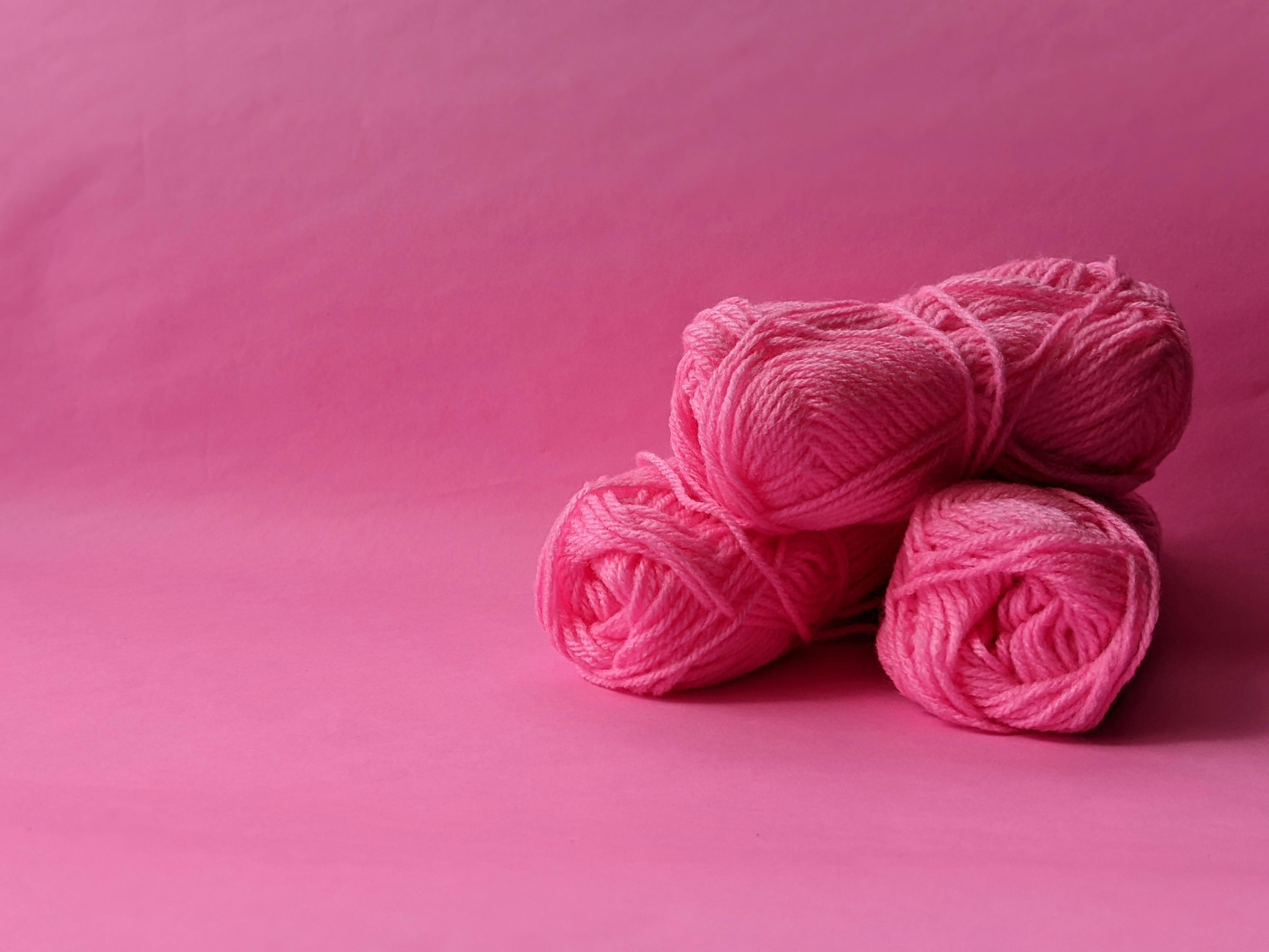 Photo of Colored Rolls of Yarn in a Shop · Free Stock Photo
