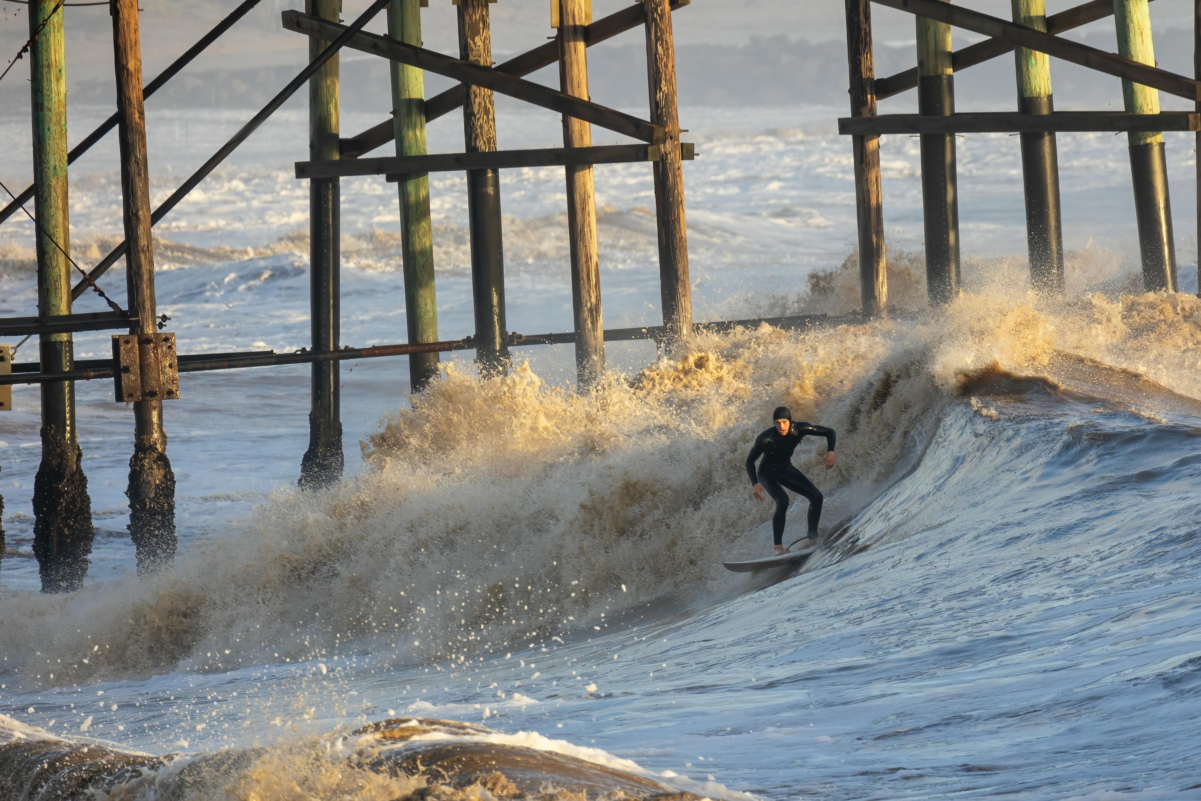 Man Surfing during High Tide · Free Stock Photo