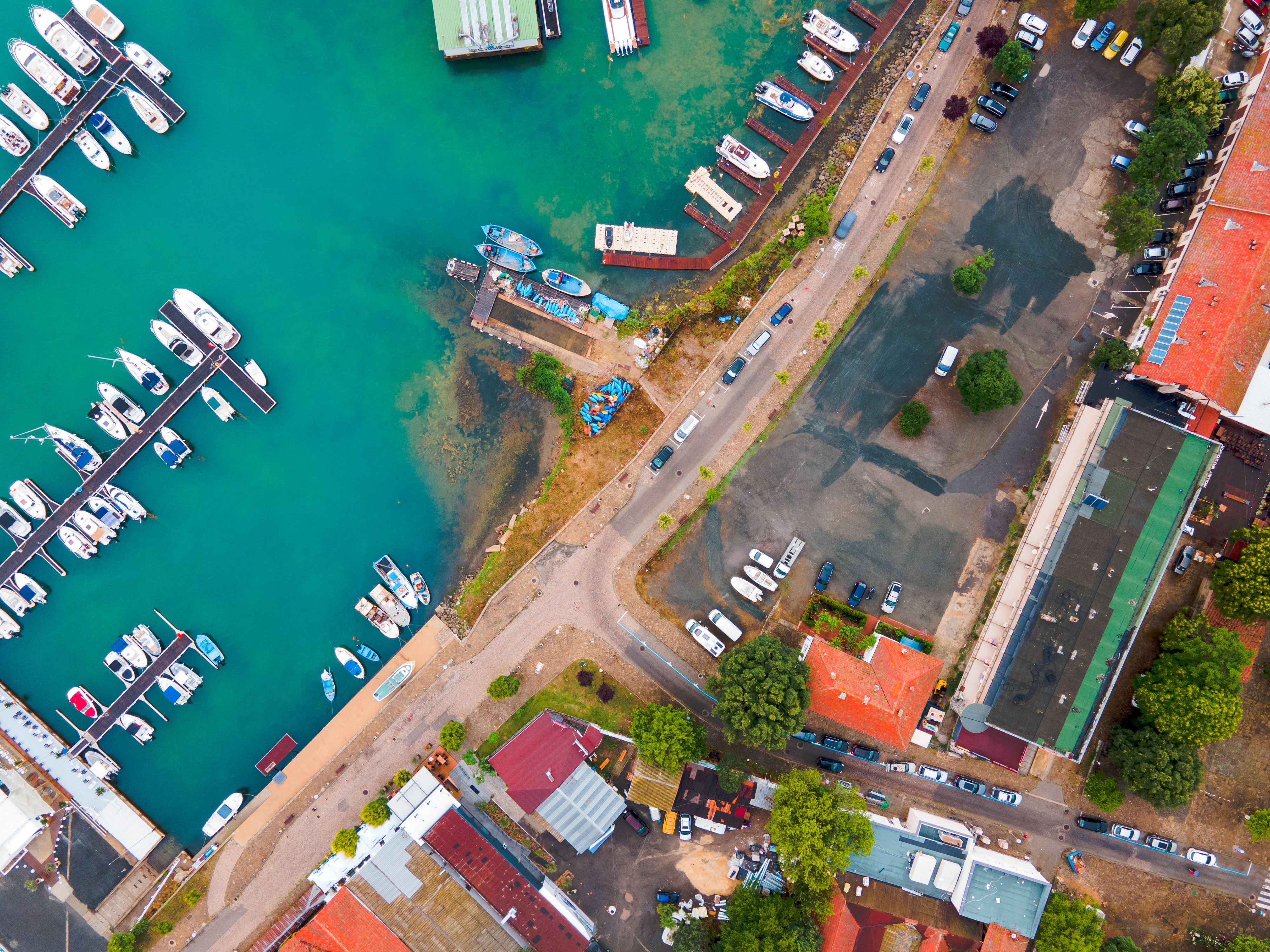 Drone Shot of Boats Moored in the Harbor · Free Stock Photo
