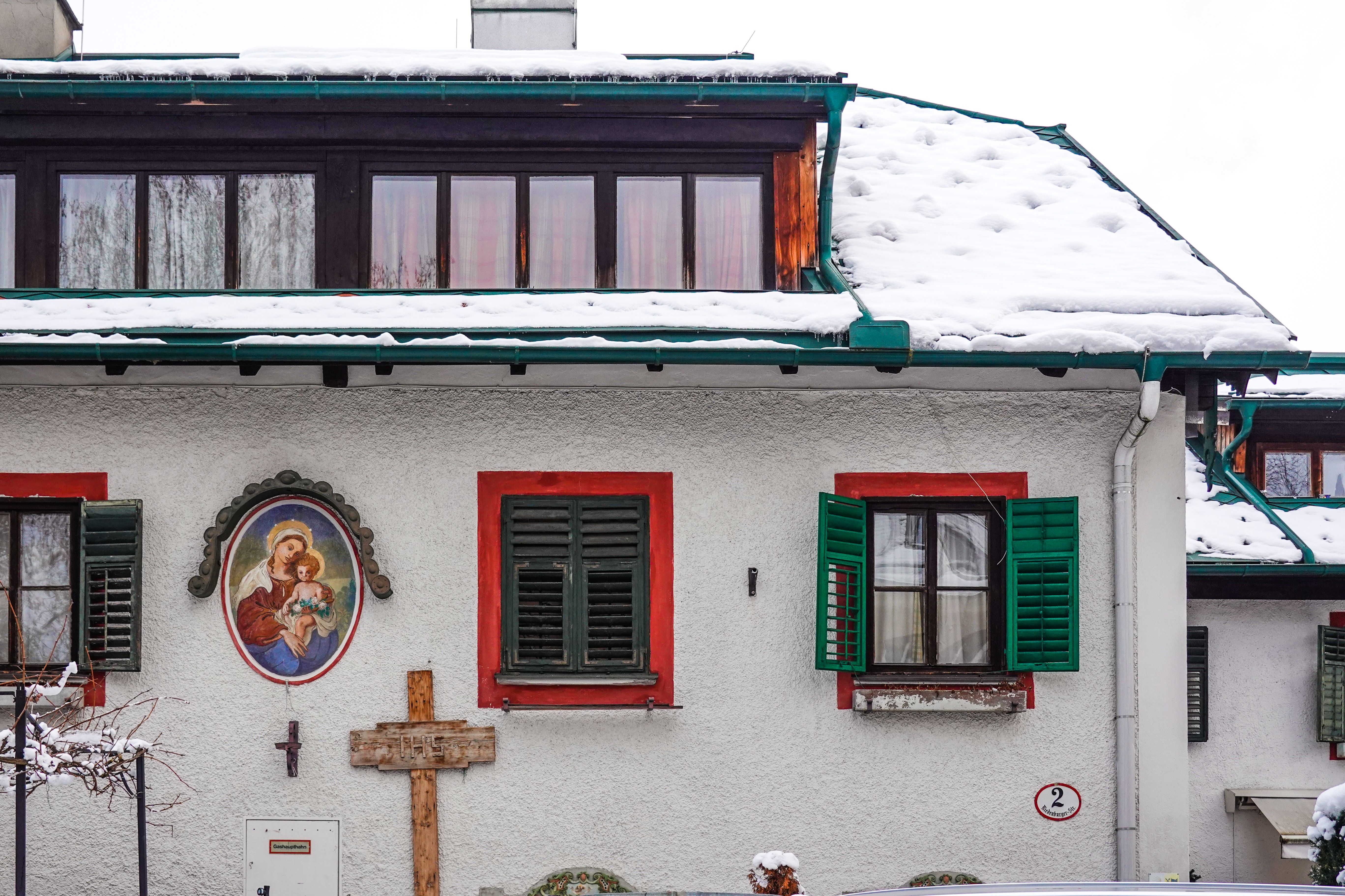 House Facade with Religious Decorations · Free Stock Photo