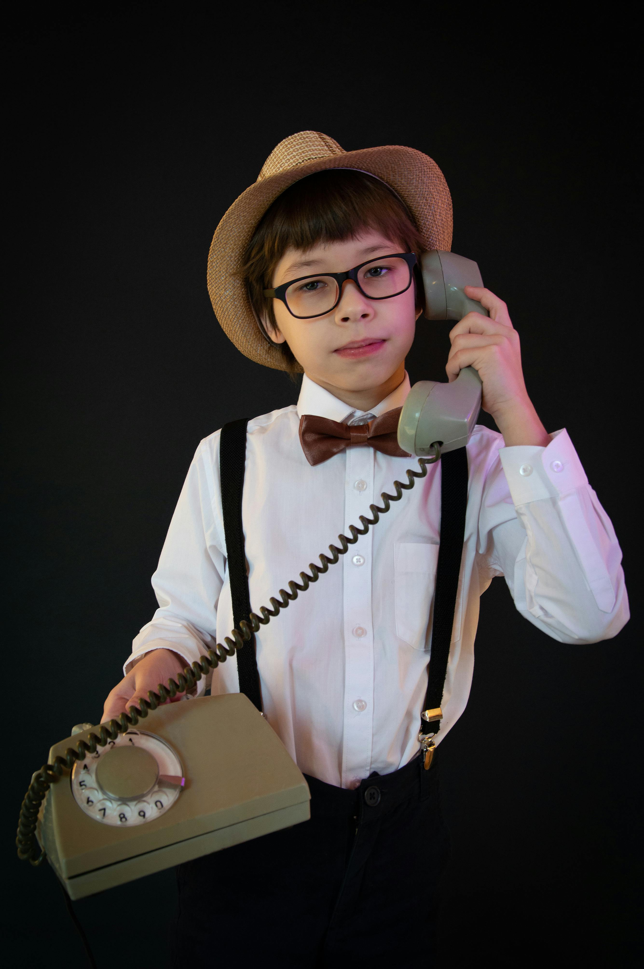 Boy with Retro Telephone · Free Stock Photo