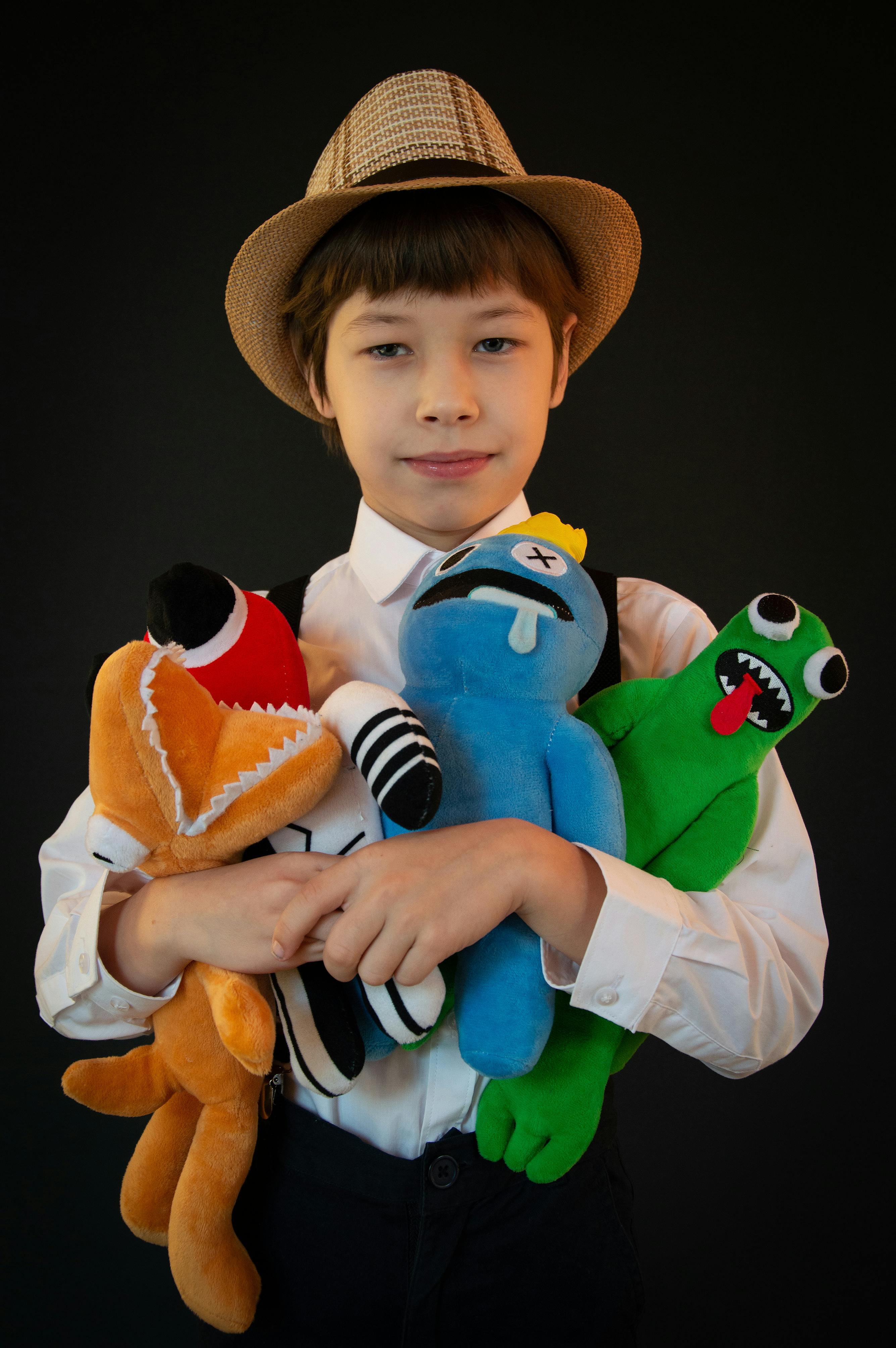 Boy Holding Black Dslr Camera · Free Stock Photo