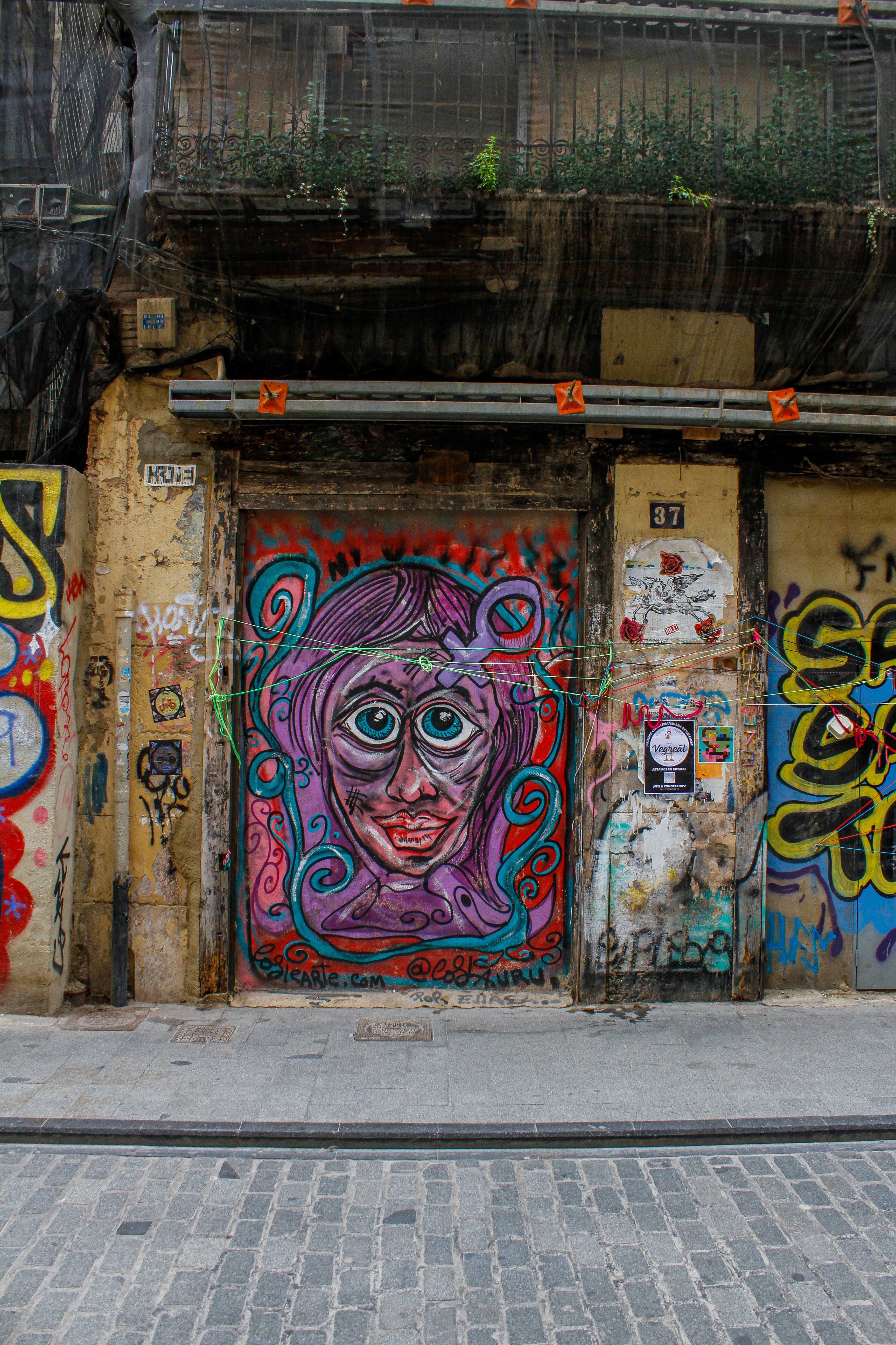 Graffiti on Building Wall · Free Stock Photo
