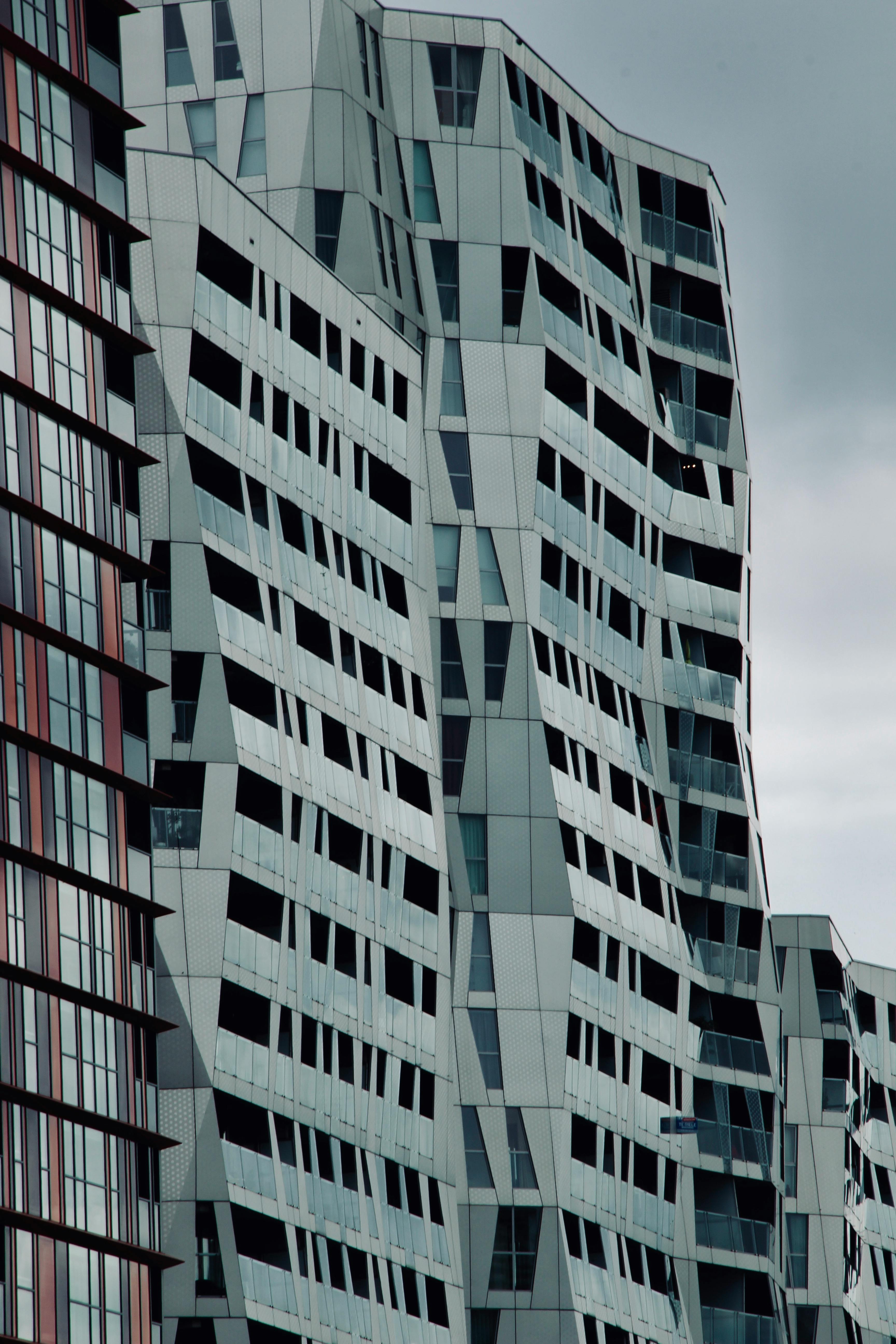 High Rise Brick Building with Arched Windows · Free Stock Photo
