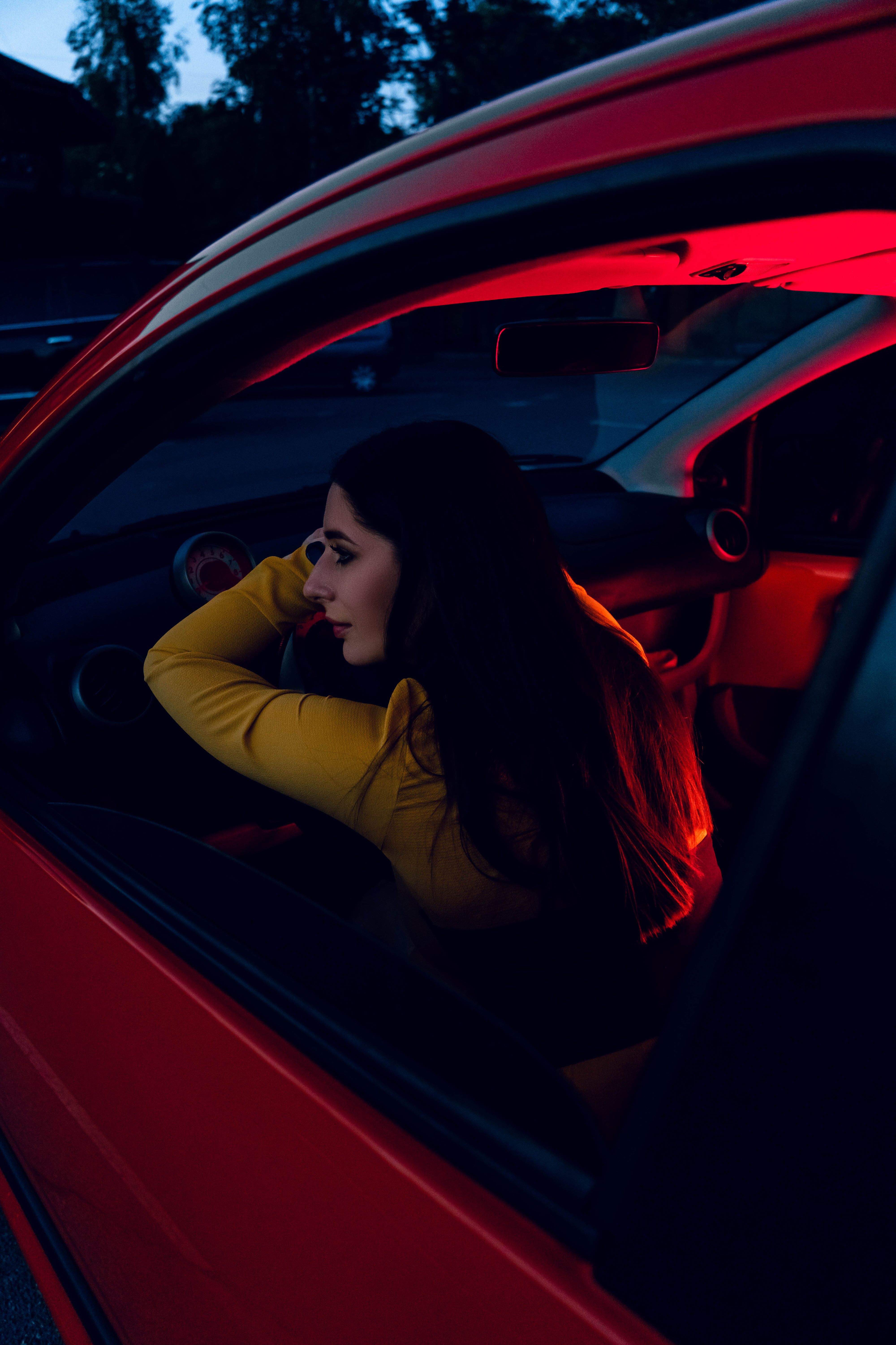 Low-Angle Shot of an Orange Car · Free Stock Photo