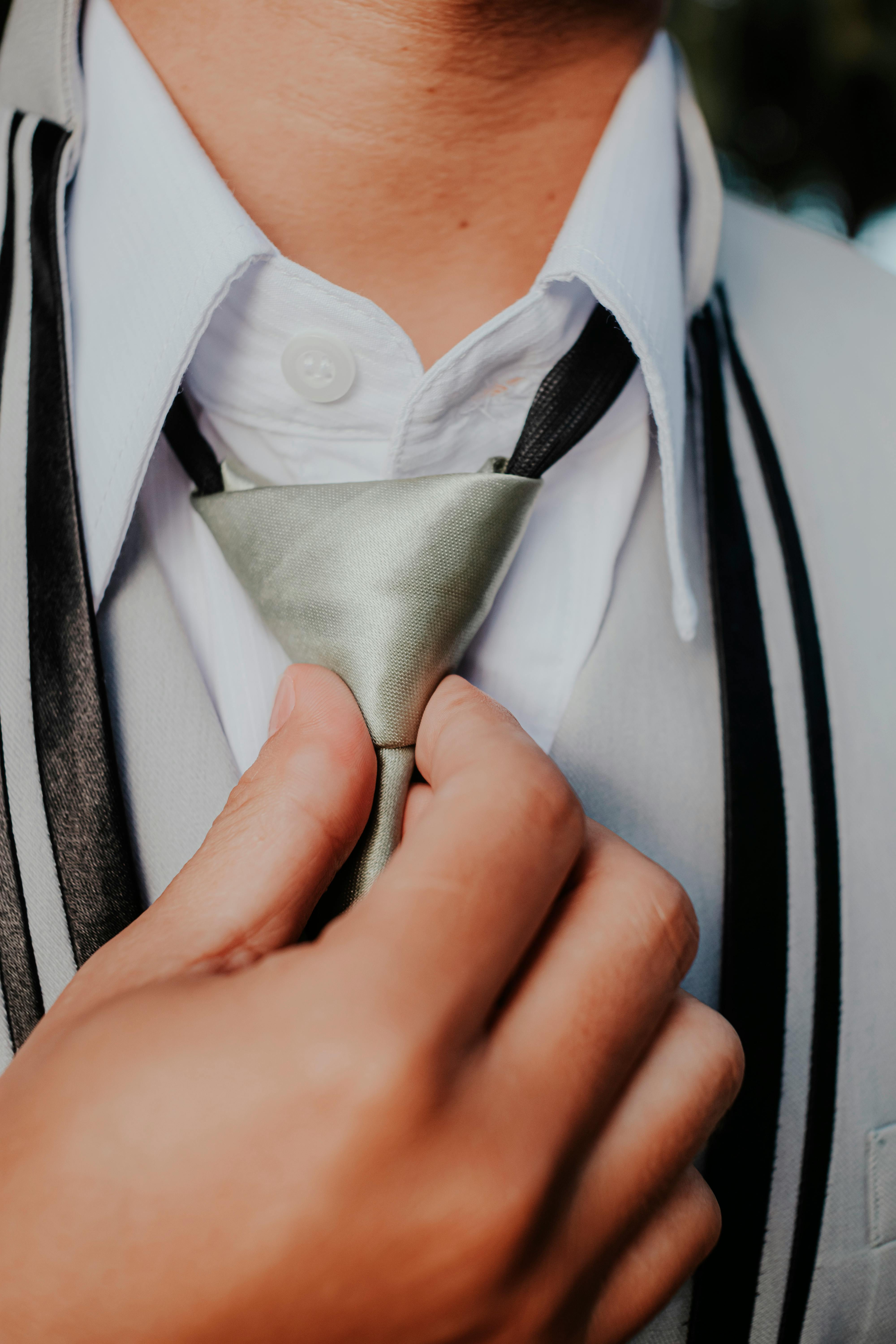 Hand on Tie · Free Stock Photo