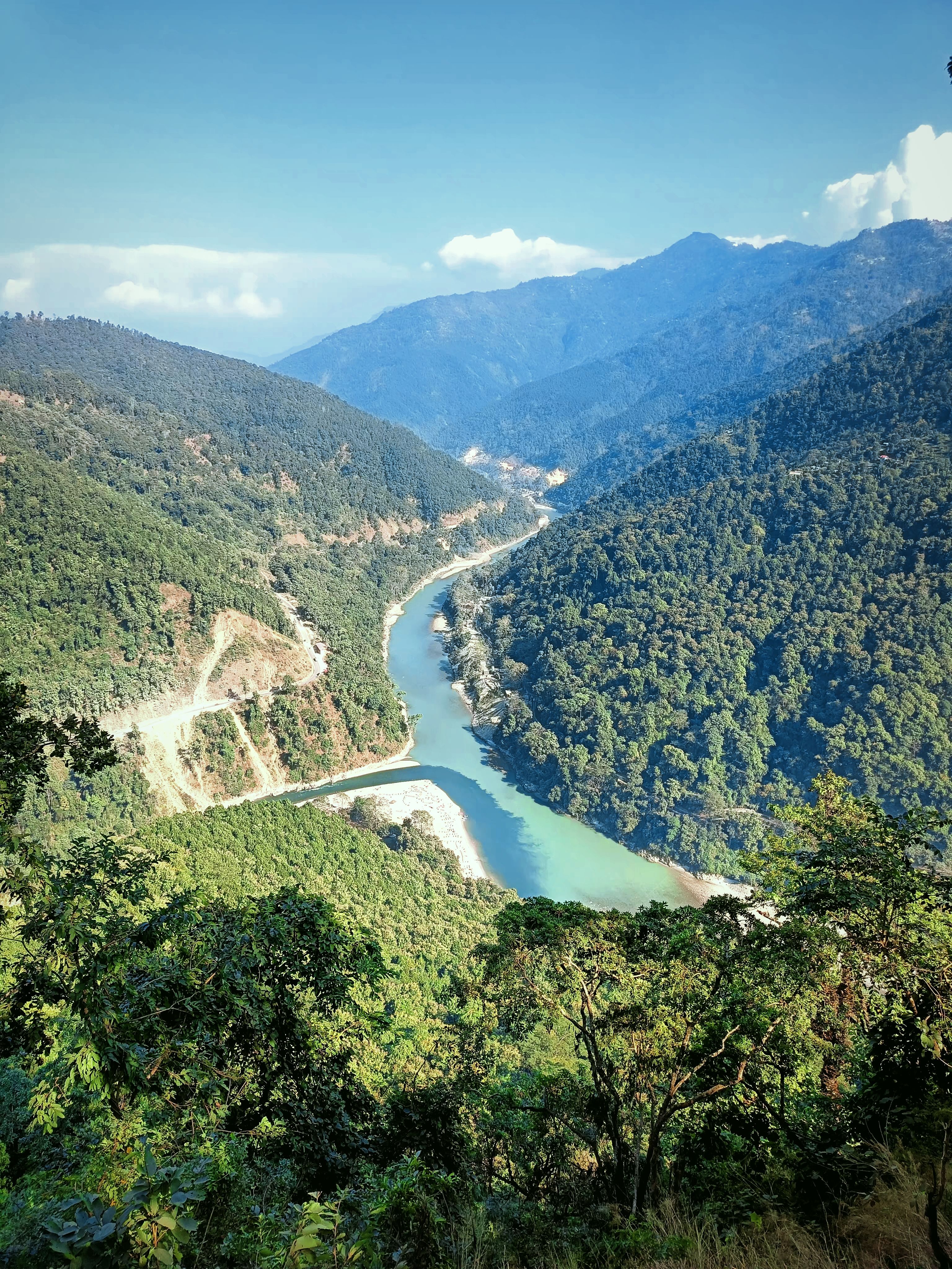 Aerial View of River in Between Green Mountains · Free Stock Photo