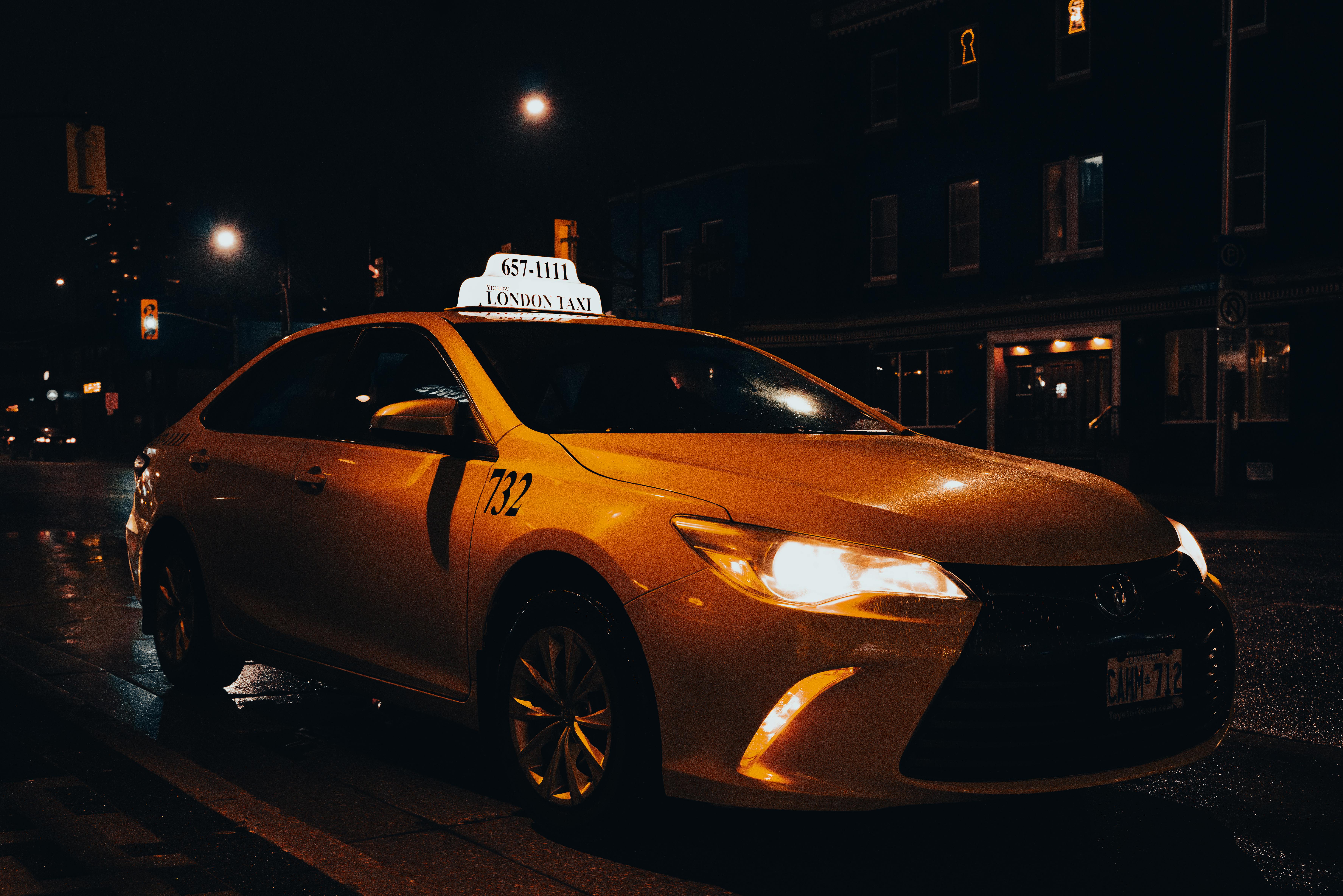 Photo of a Taxi at Night Time · Free Stock Photo