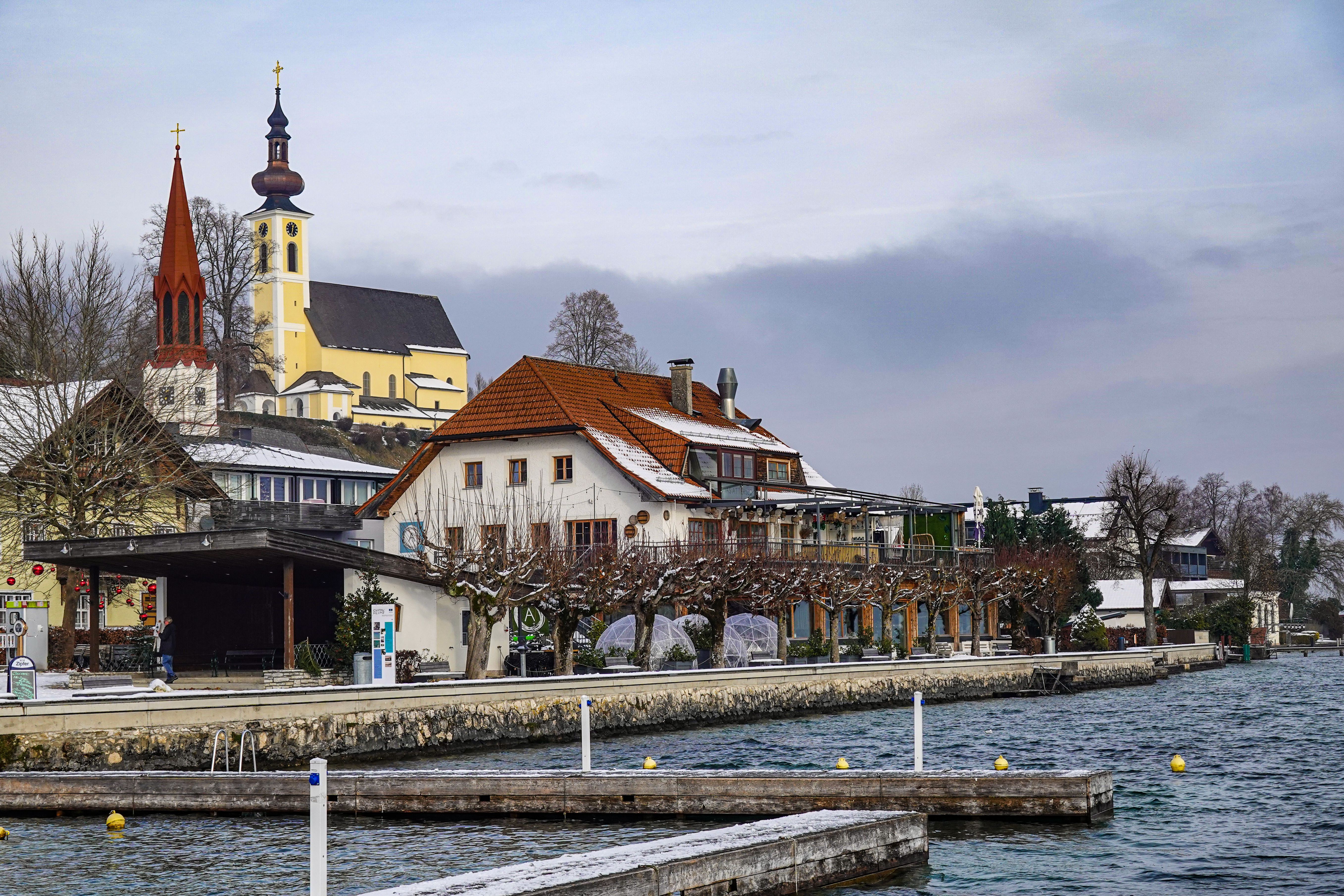 A small town with a church and a pier · Free Stock Photo
