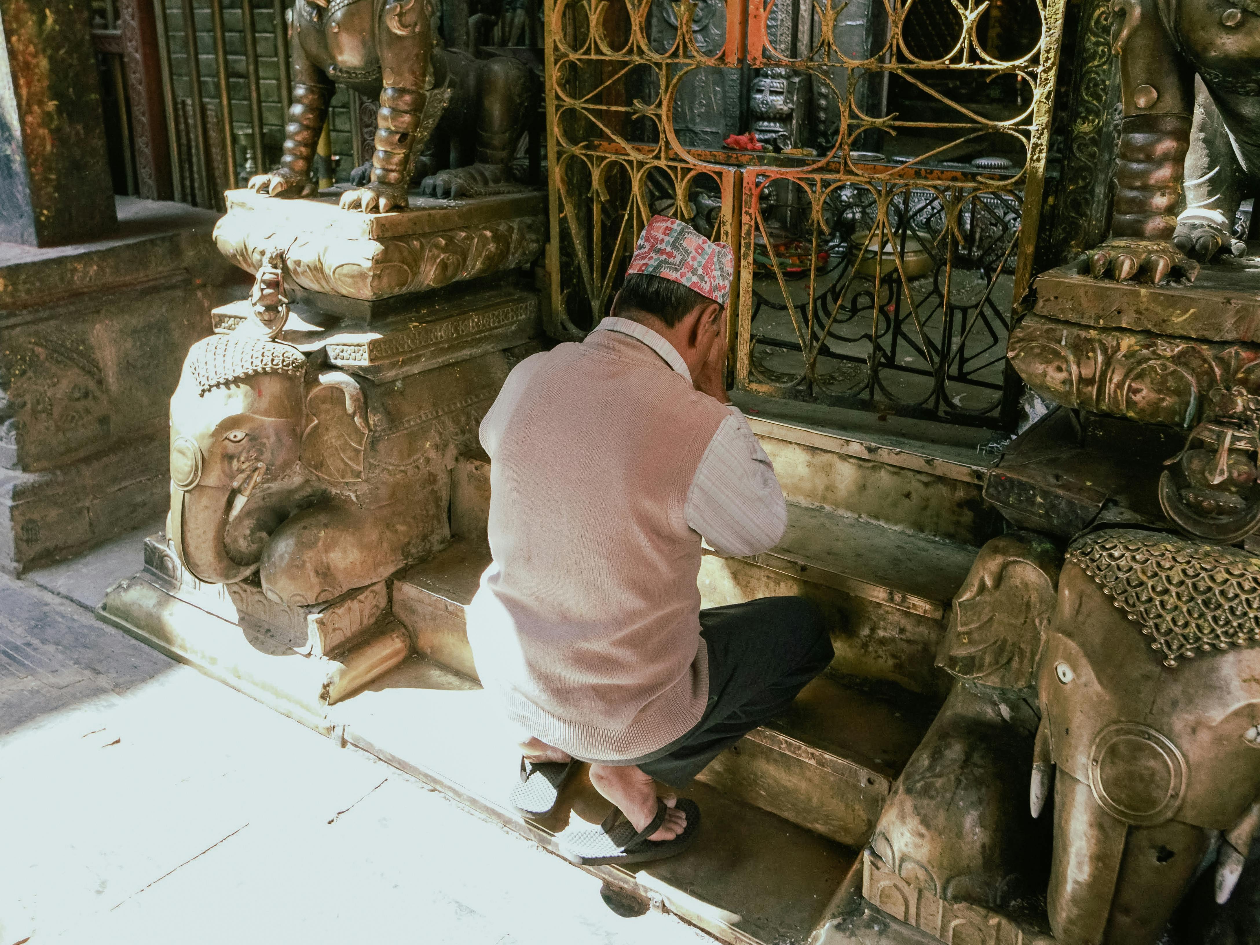 Man Praying at Temple · Free Stock Photo