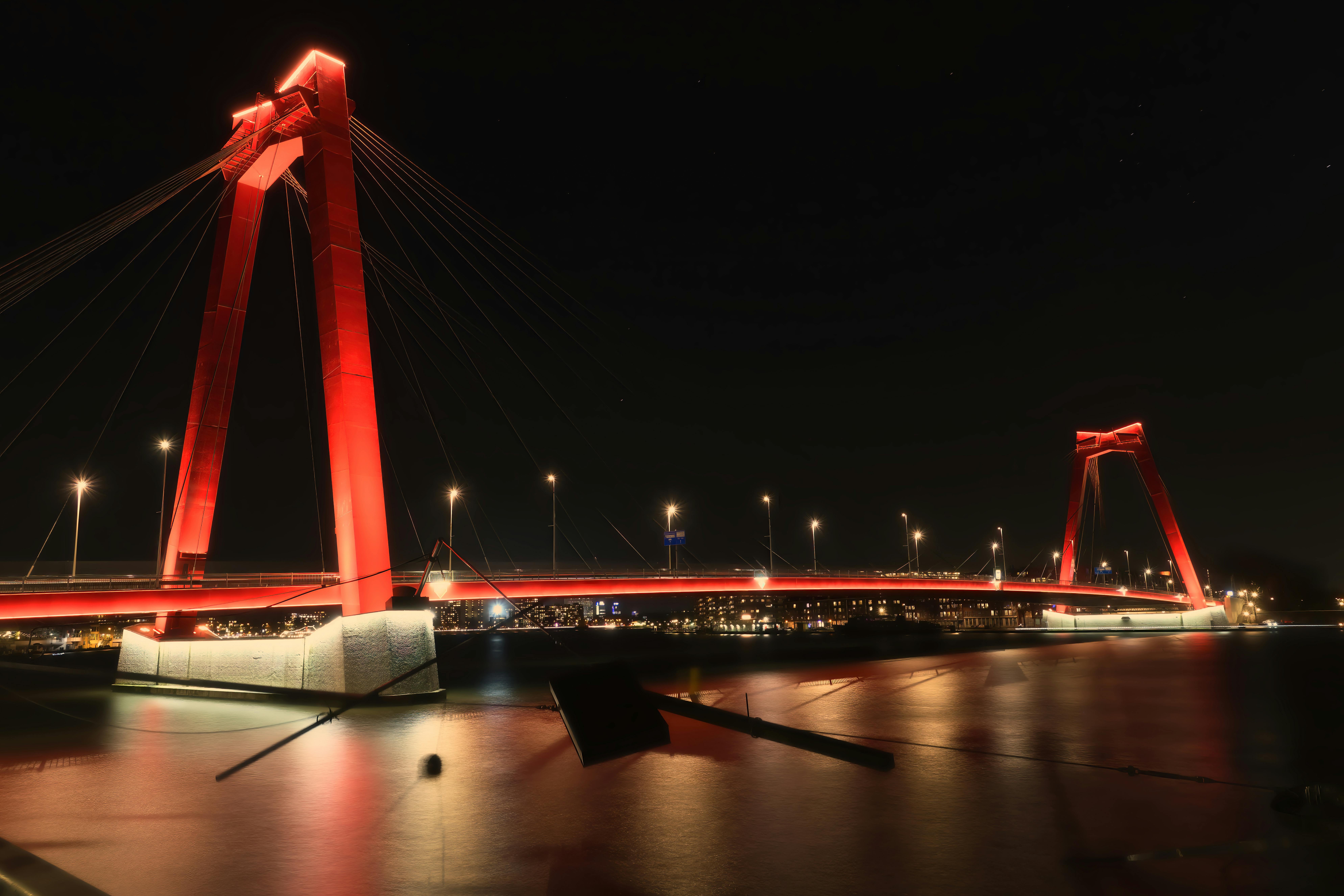 Illuminated Suspension Bridge at Night · Free Stock Photo