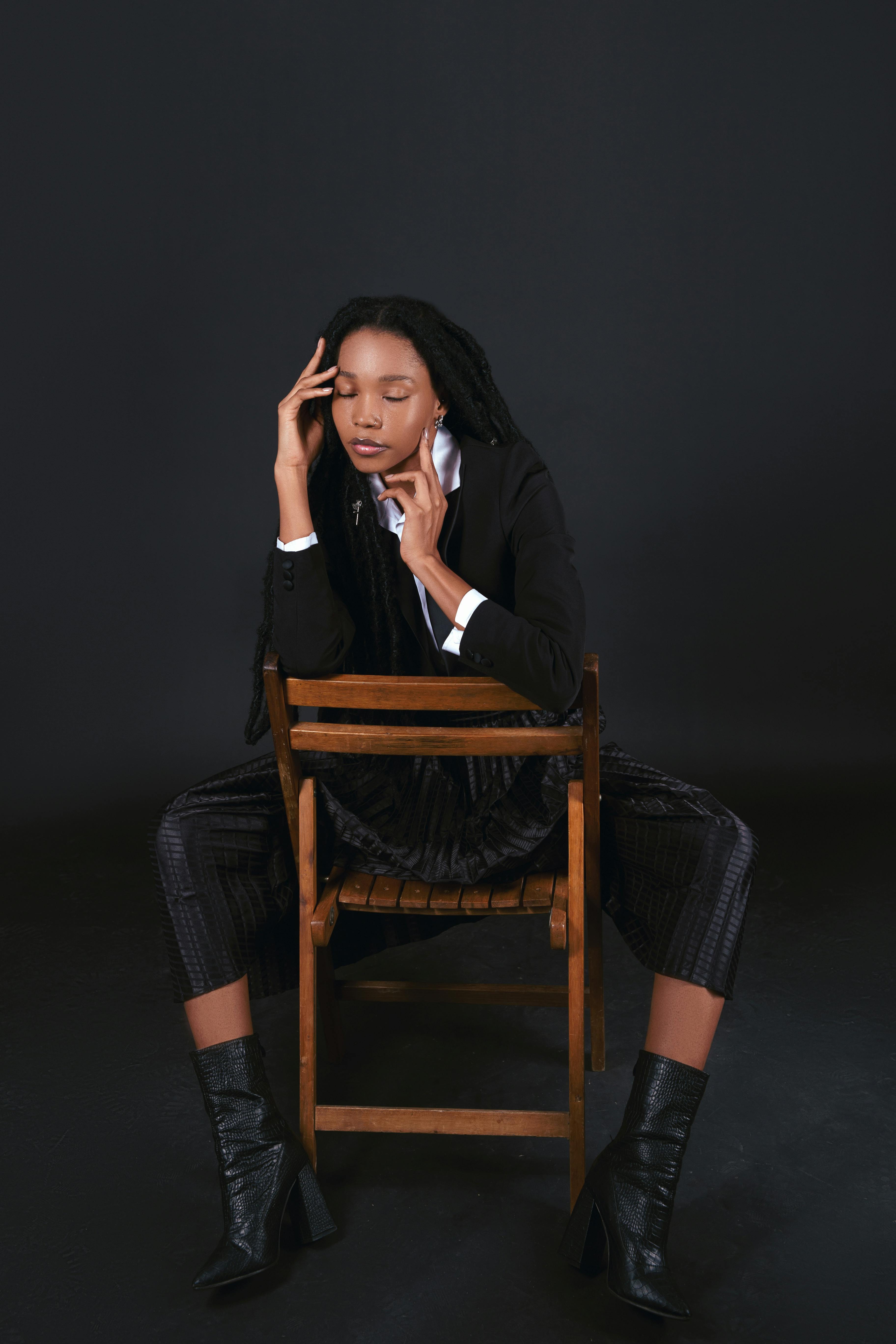 Woman Sitting Backward on a Chair · Free Stock Photo
