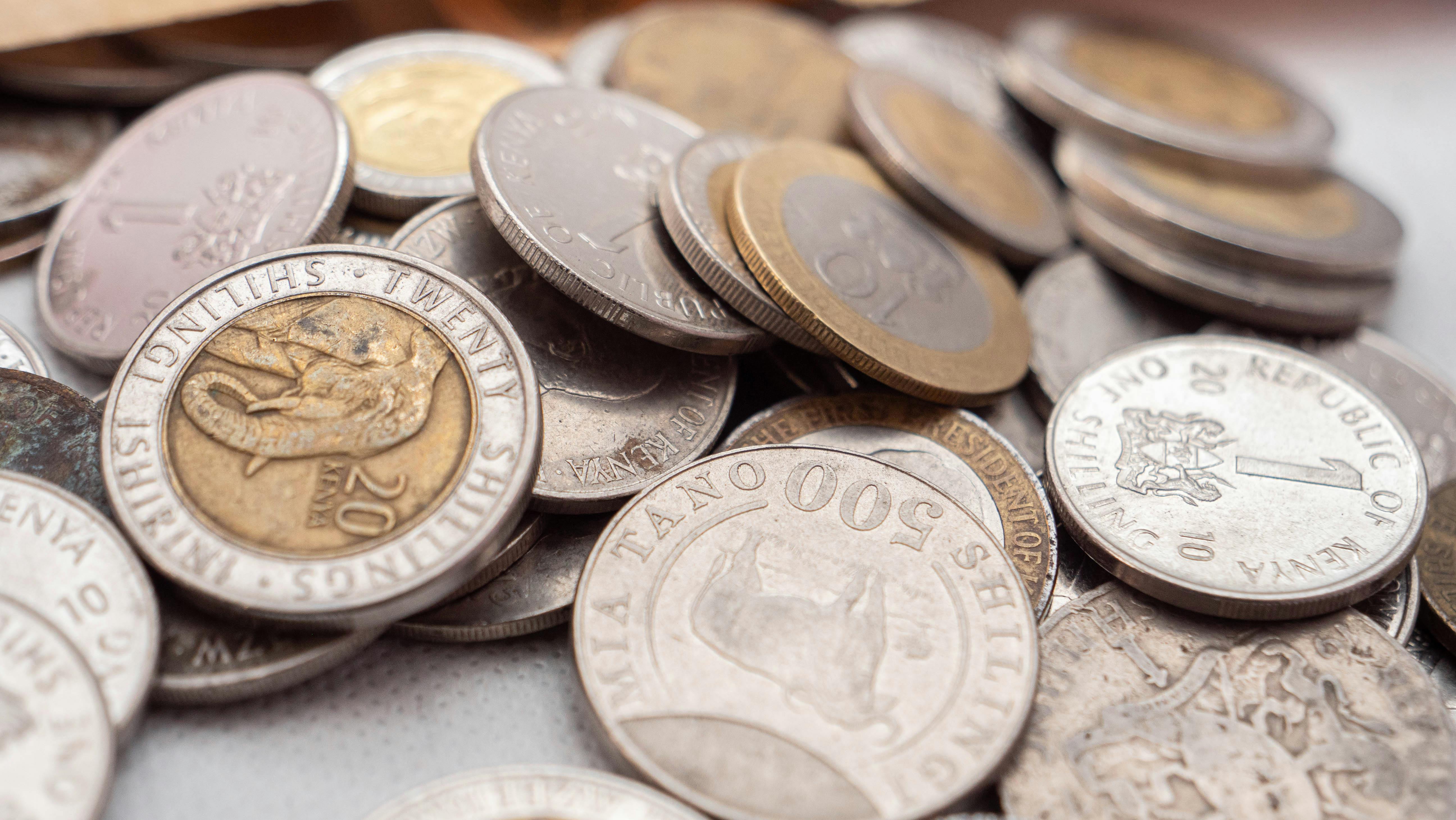 Selective Focus Photo of Stacked Coins · Free Stock Photo