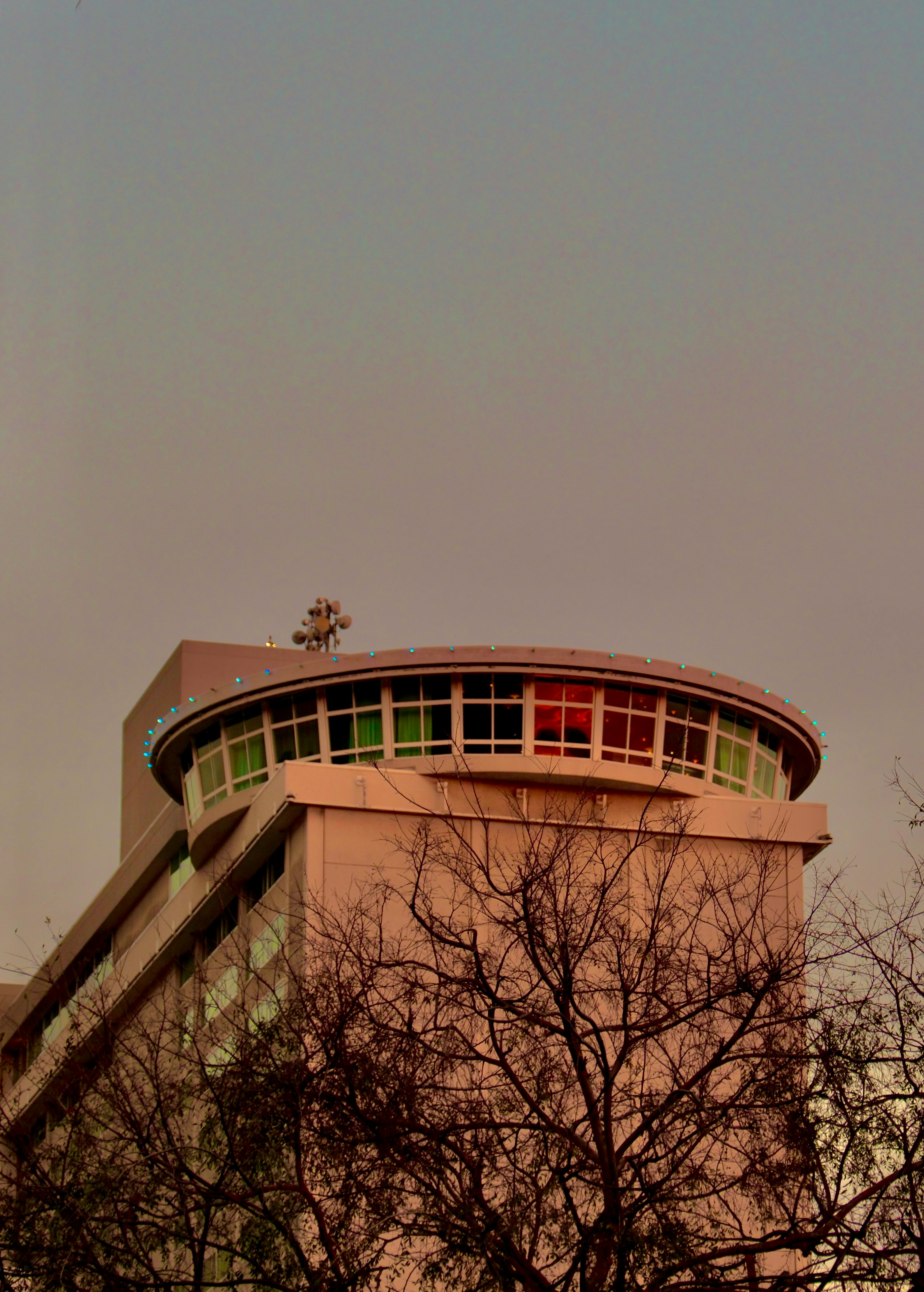 Vikas Minar Building Near Trees · Free Stock Photo