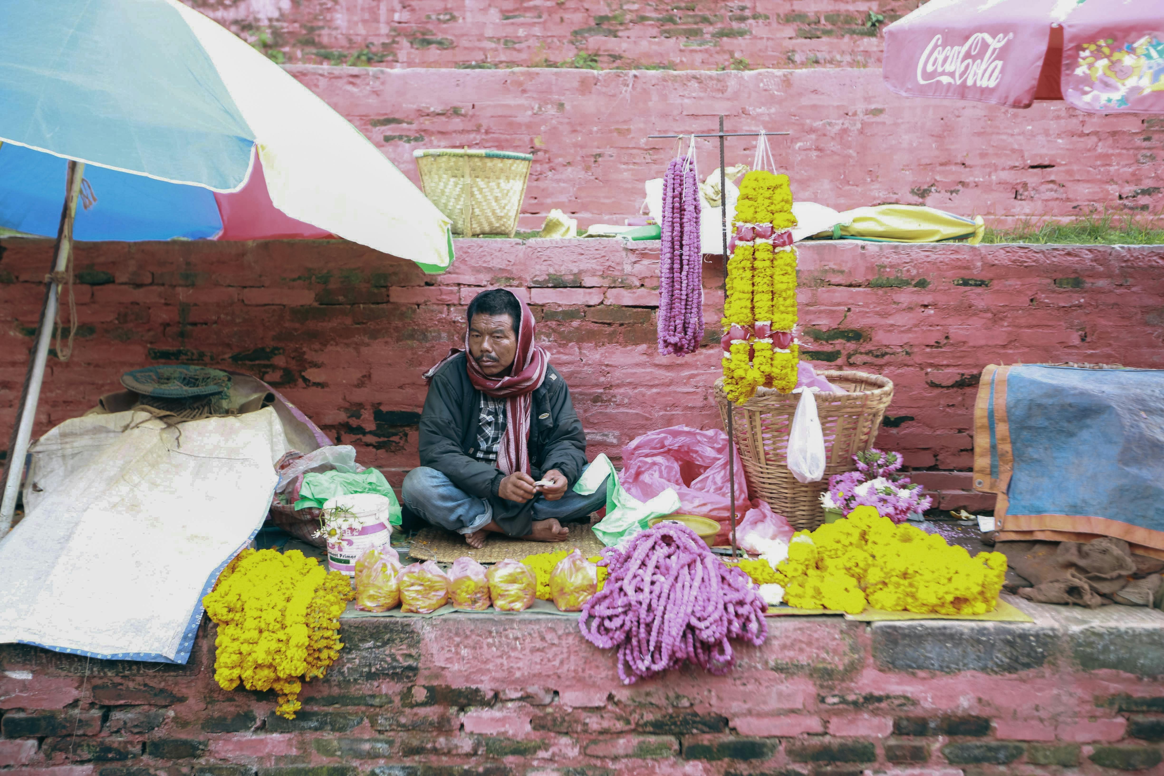 Merchants at Stall with Pumpkins · Free Stock Photo