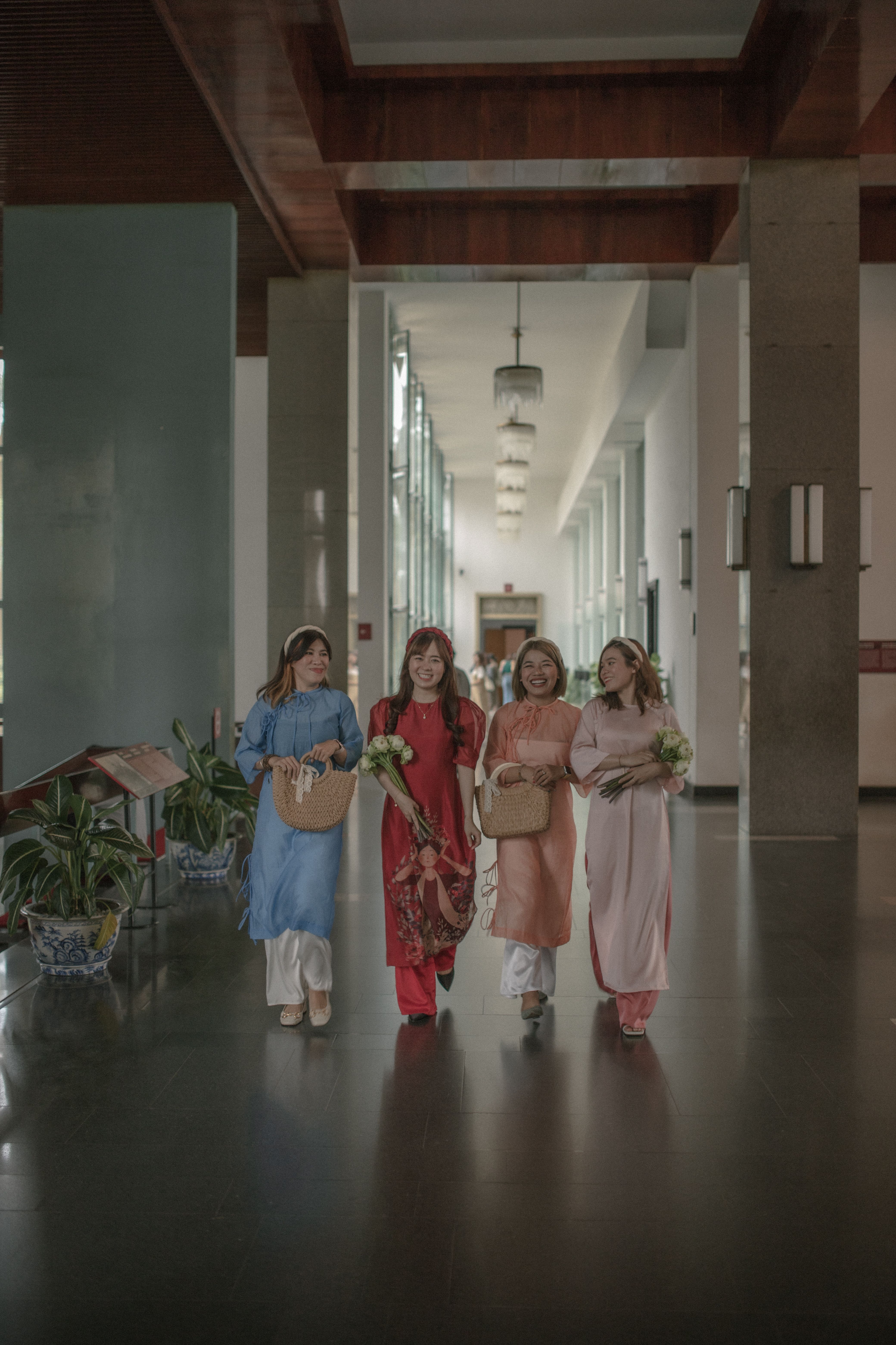 Women Standing in a Hallway · Free Stock Photo