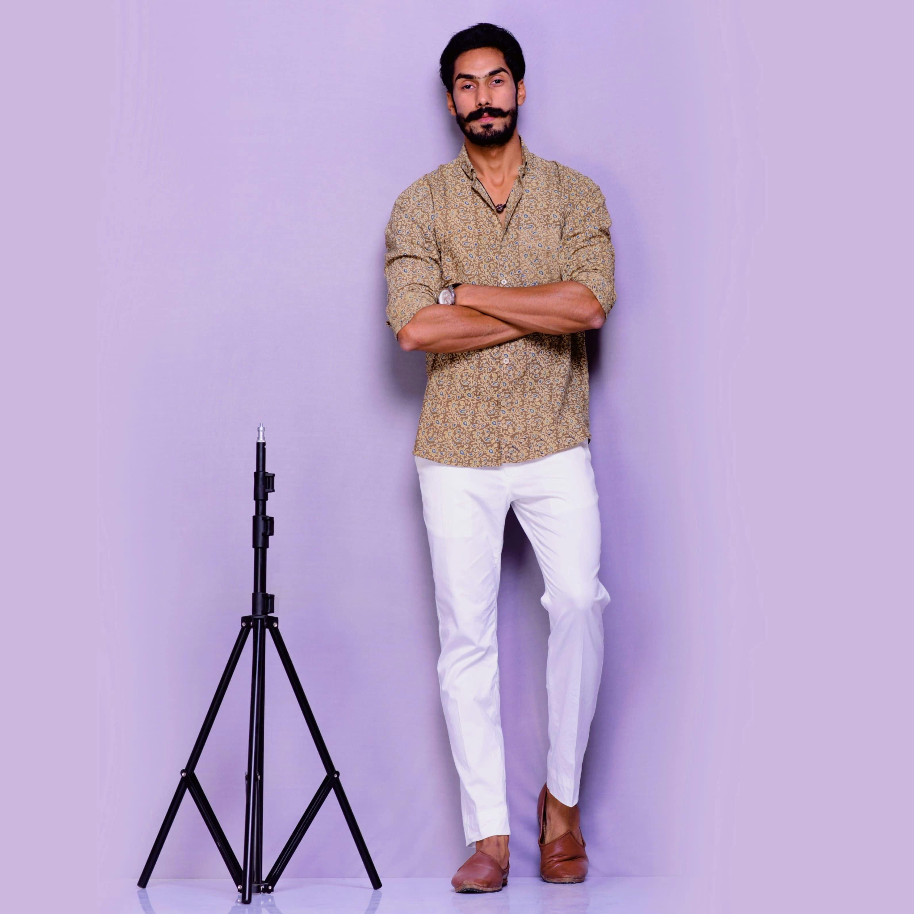 Man Posing with Tripod · Free Stock Photo