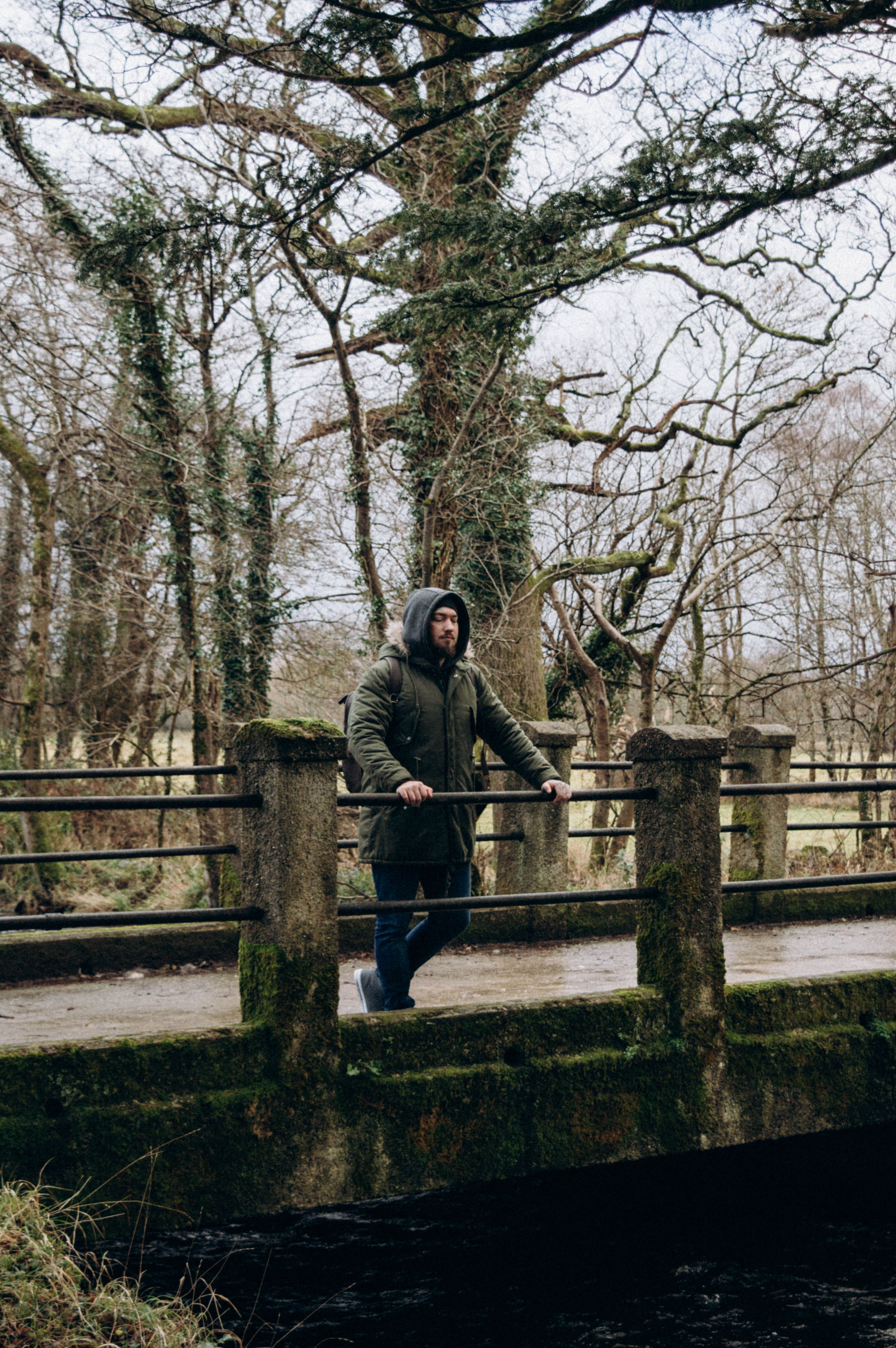 Man On Old Bridge in Park · Free Stock Photo