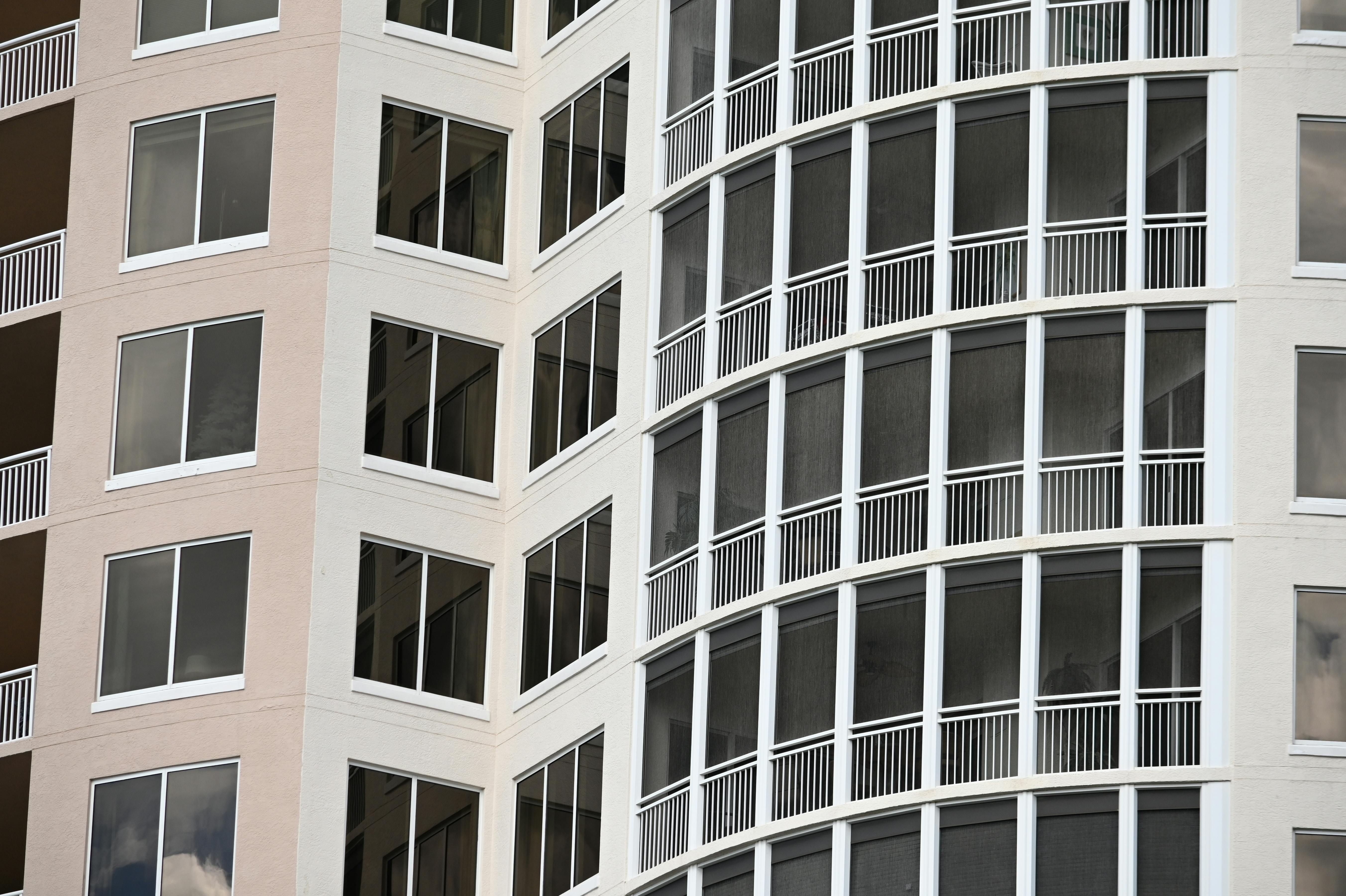 White Building with Glass Windows · Free Stock Photo