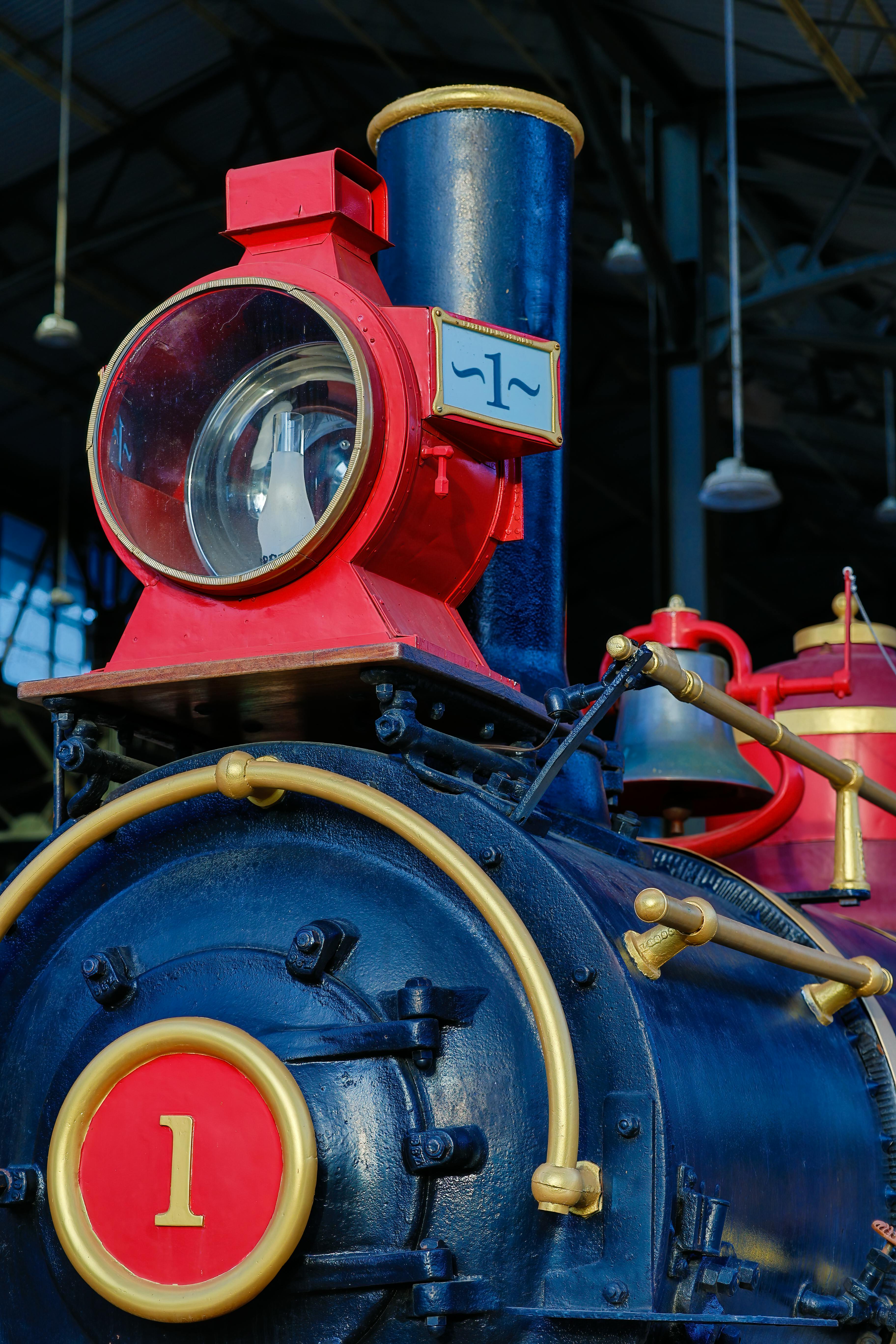 A Red and Black Steam Locomotive · Free Stock Photo