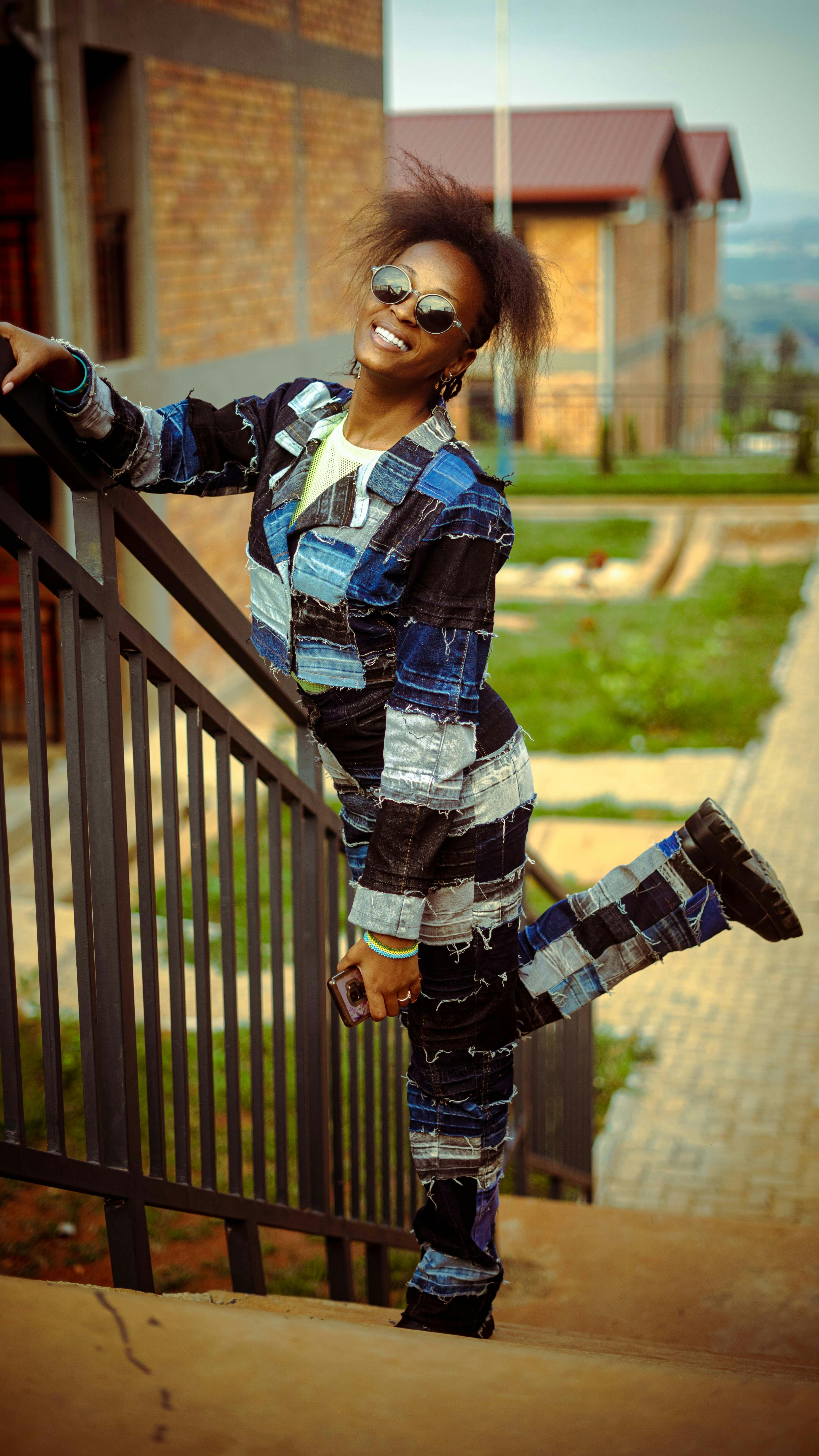 Smiling Model in Denim Outfit · Free Stock Photo