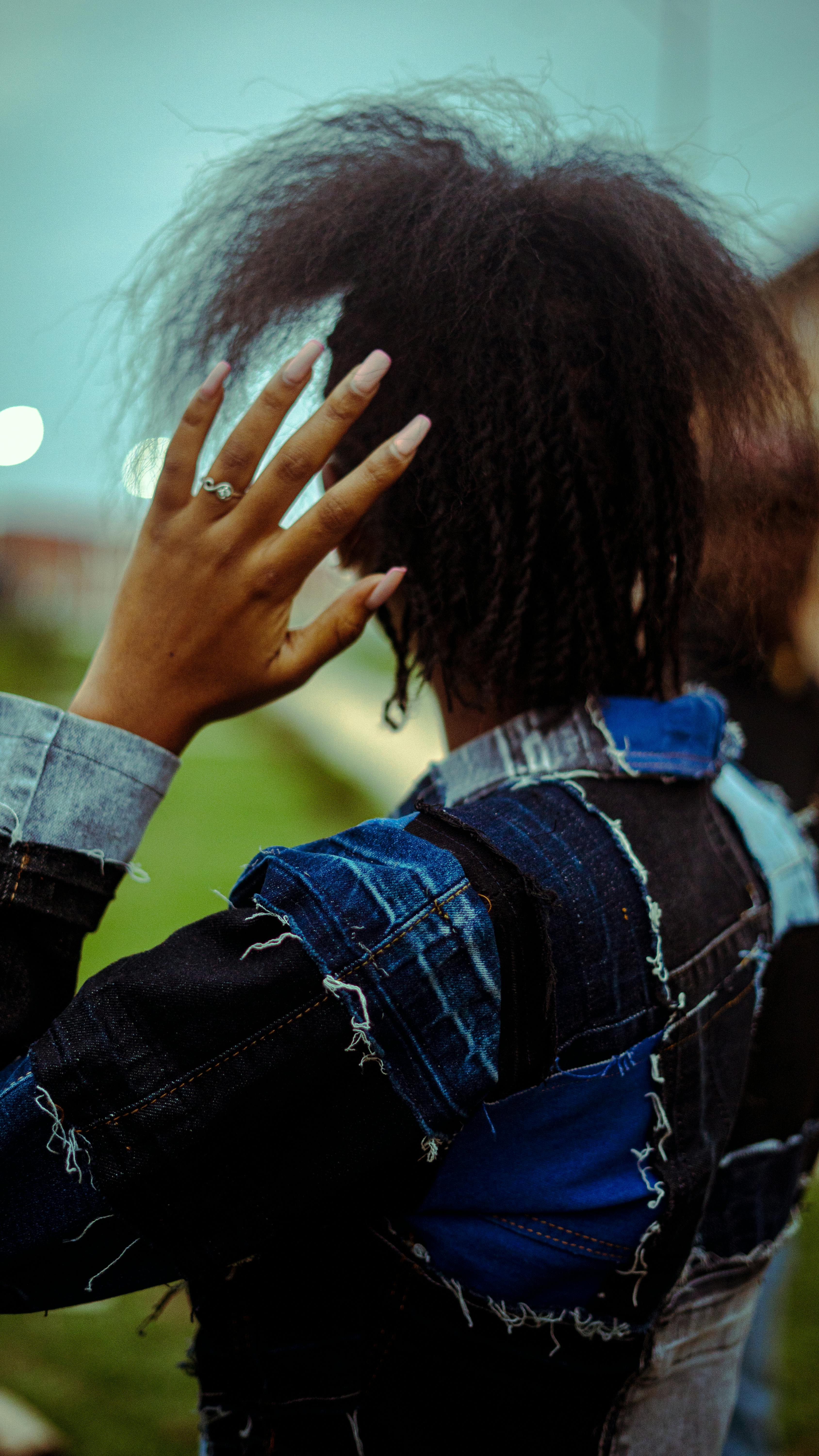 Woman Hand over Head · Free Stock Photo