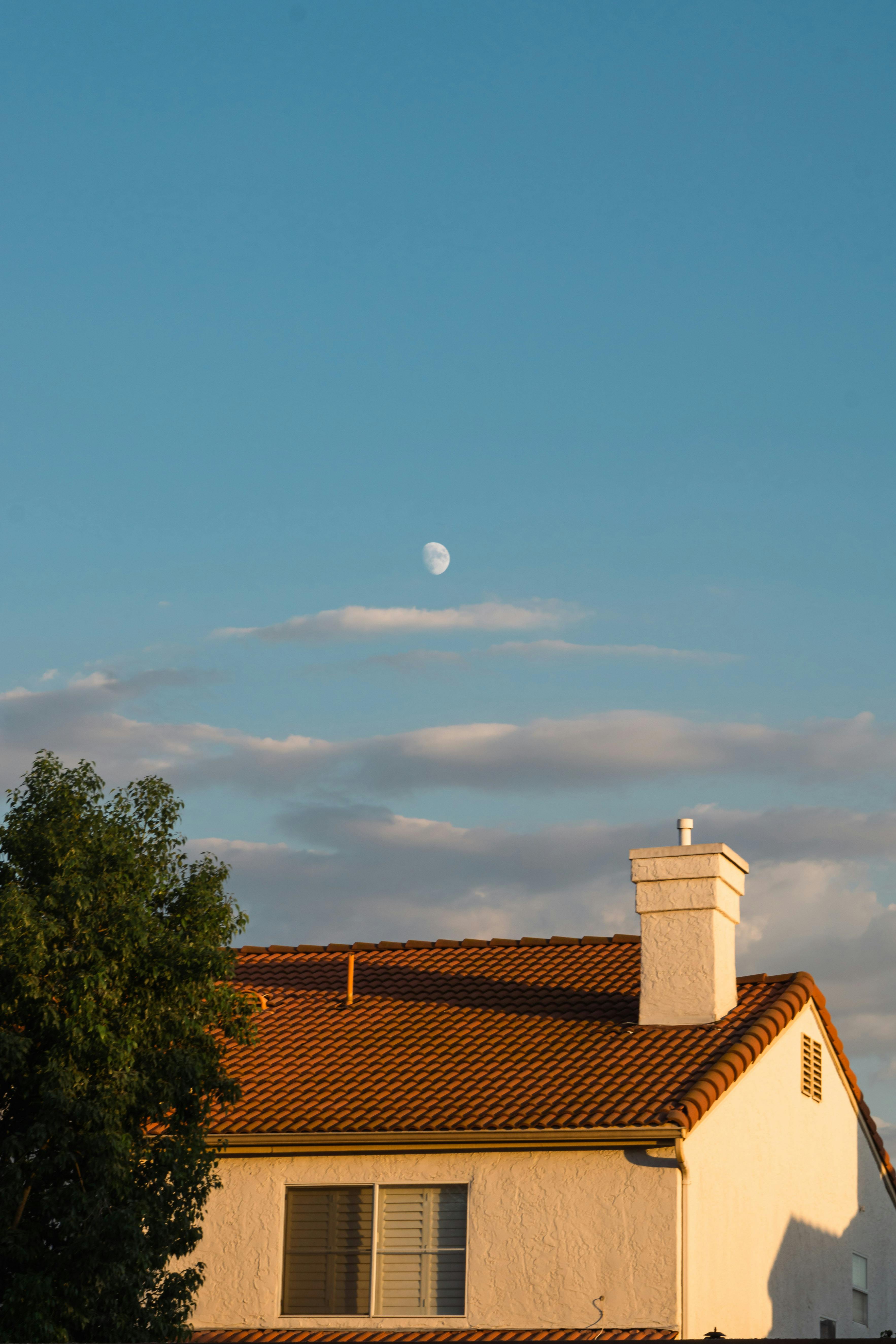 Moon on Blue Sky over House · Free Stock Photo