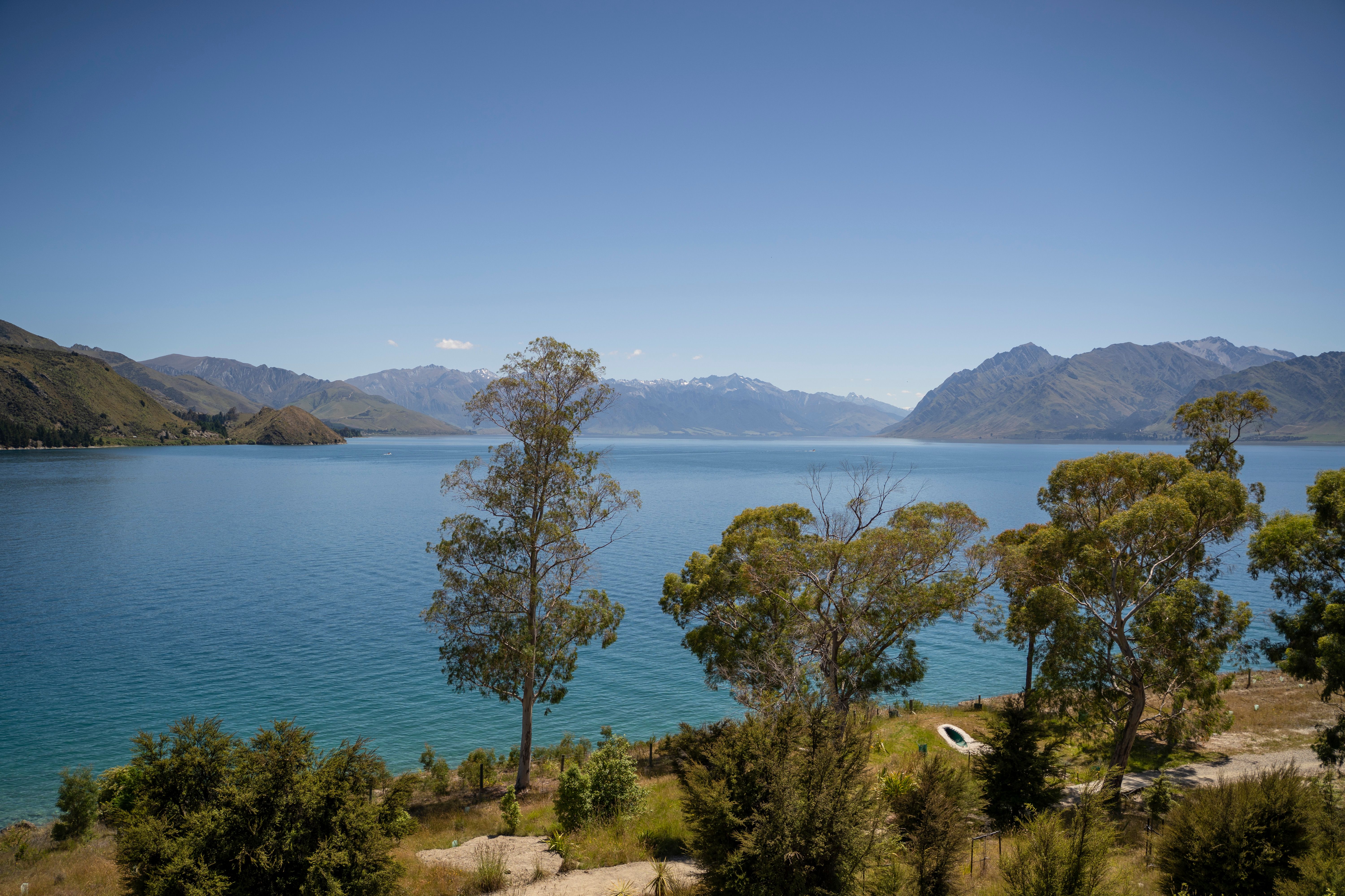 Landscape of the Wanaka Lake and Mountains under Blue Sky · Free Stock ...