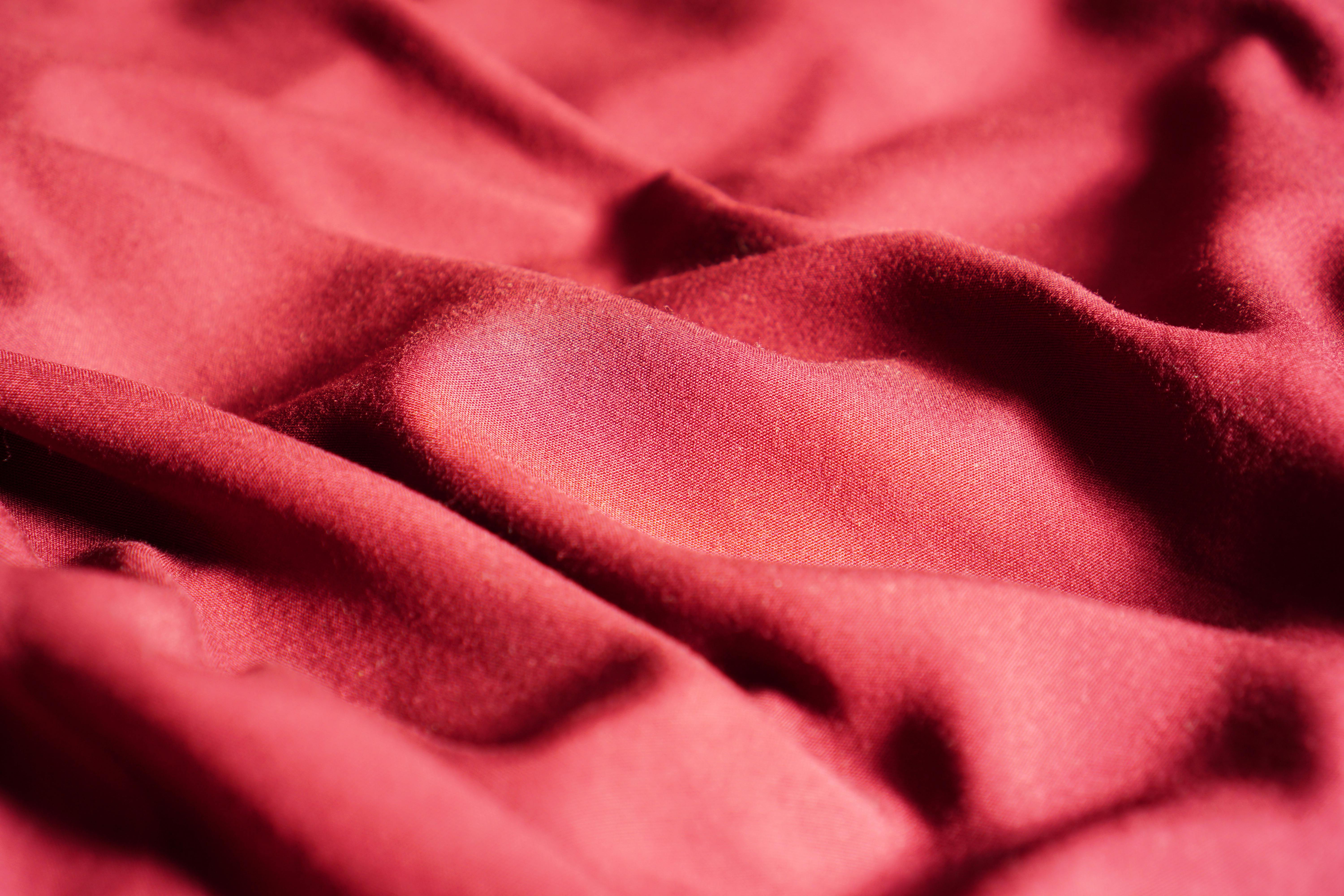 Ripples on a Red Silk Fabric · Free Stock Photo