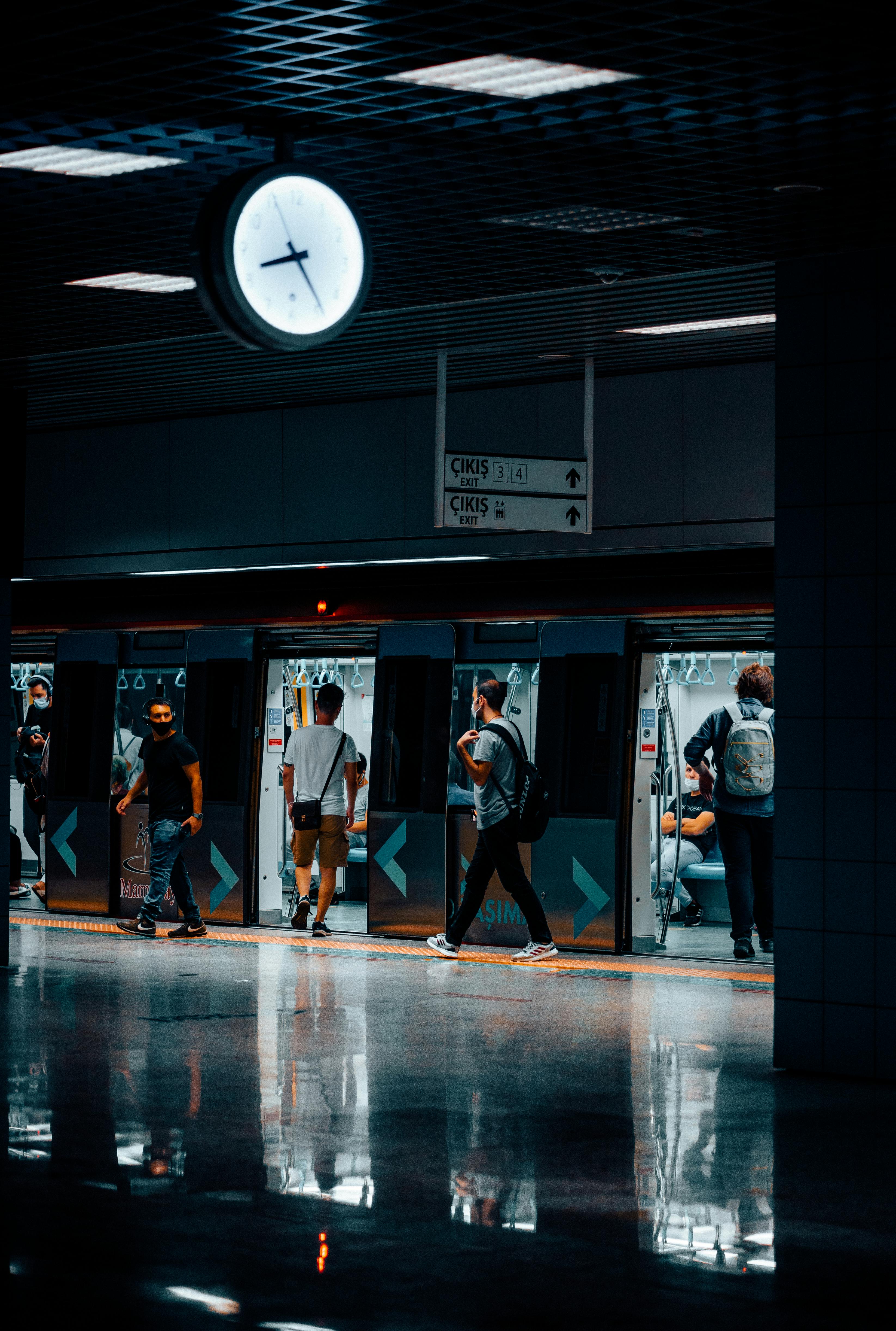 Photo of People Going In and Out of a Metro · Free Stock Photo