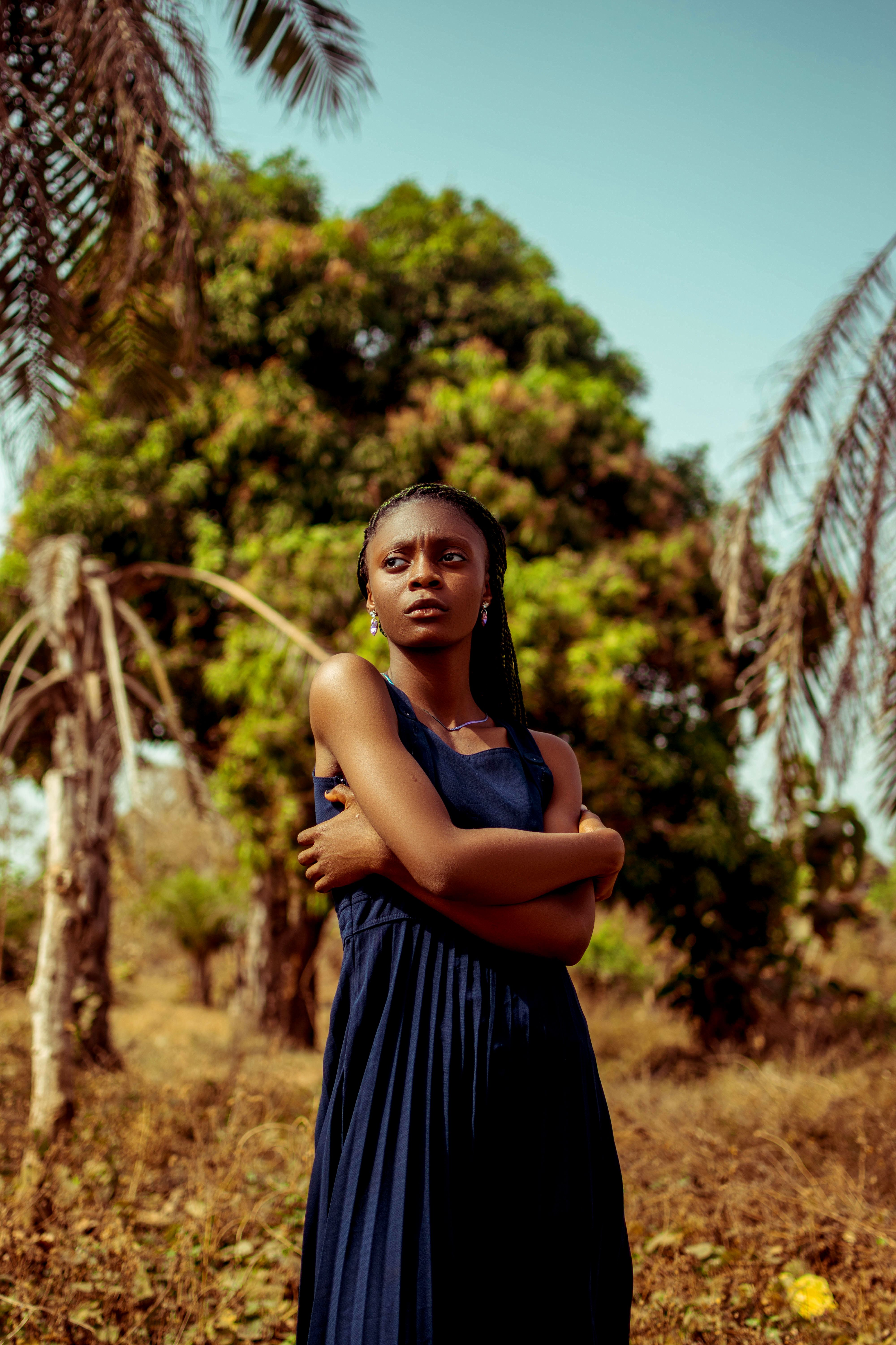 Portrait of an African Woman in Front of Trees · Free Stock Photo
