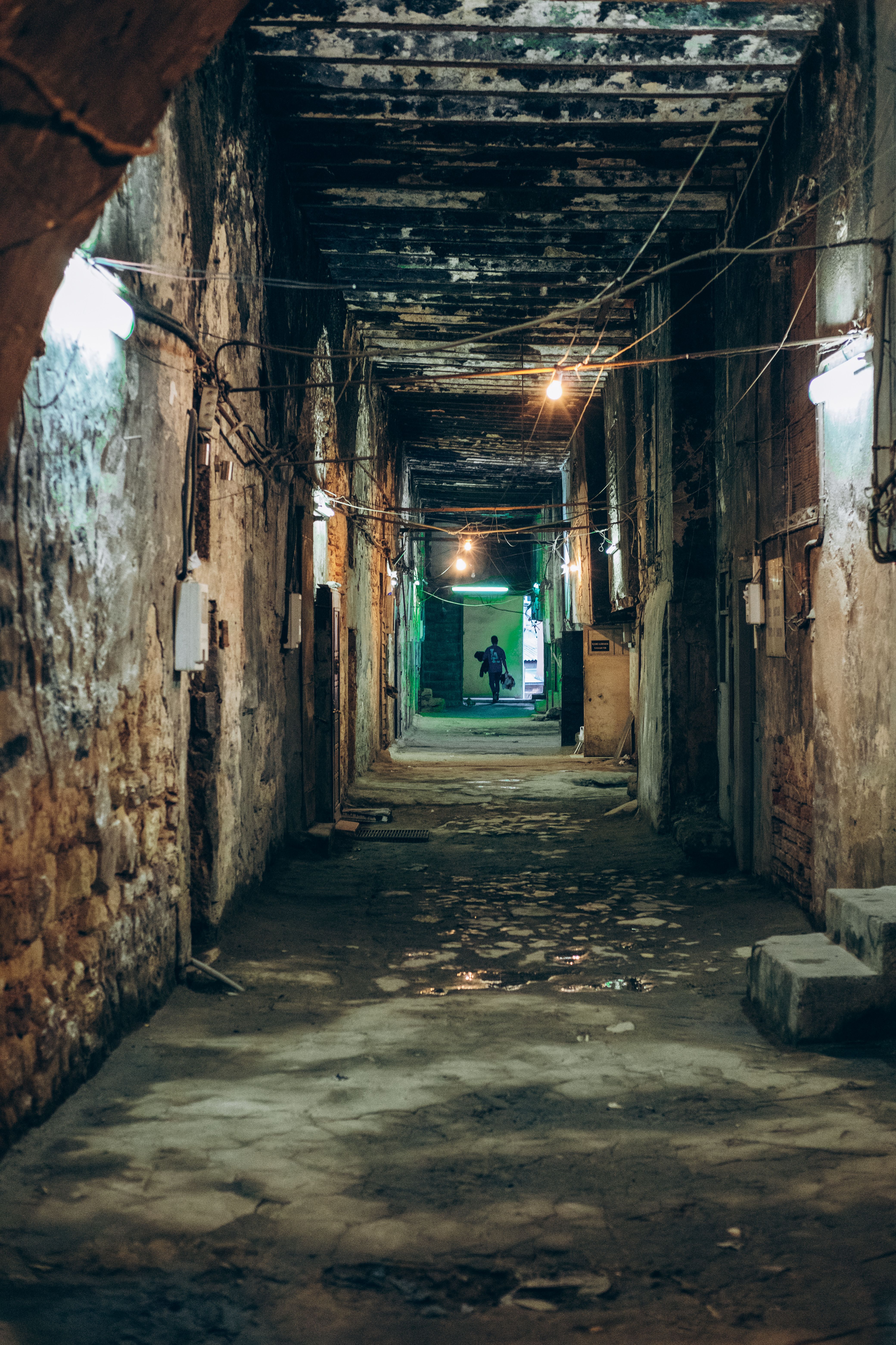 A Person Walking on an Alleyway · Free Stock Photo