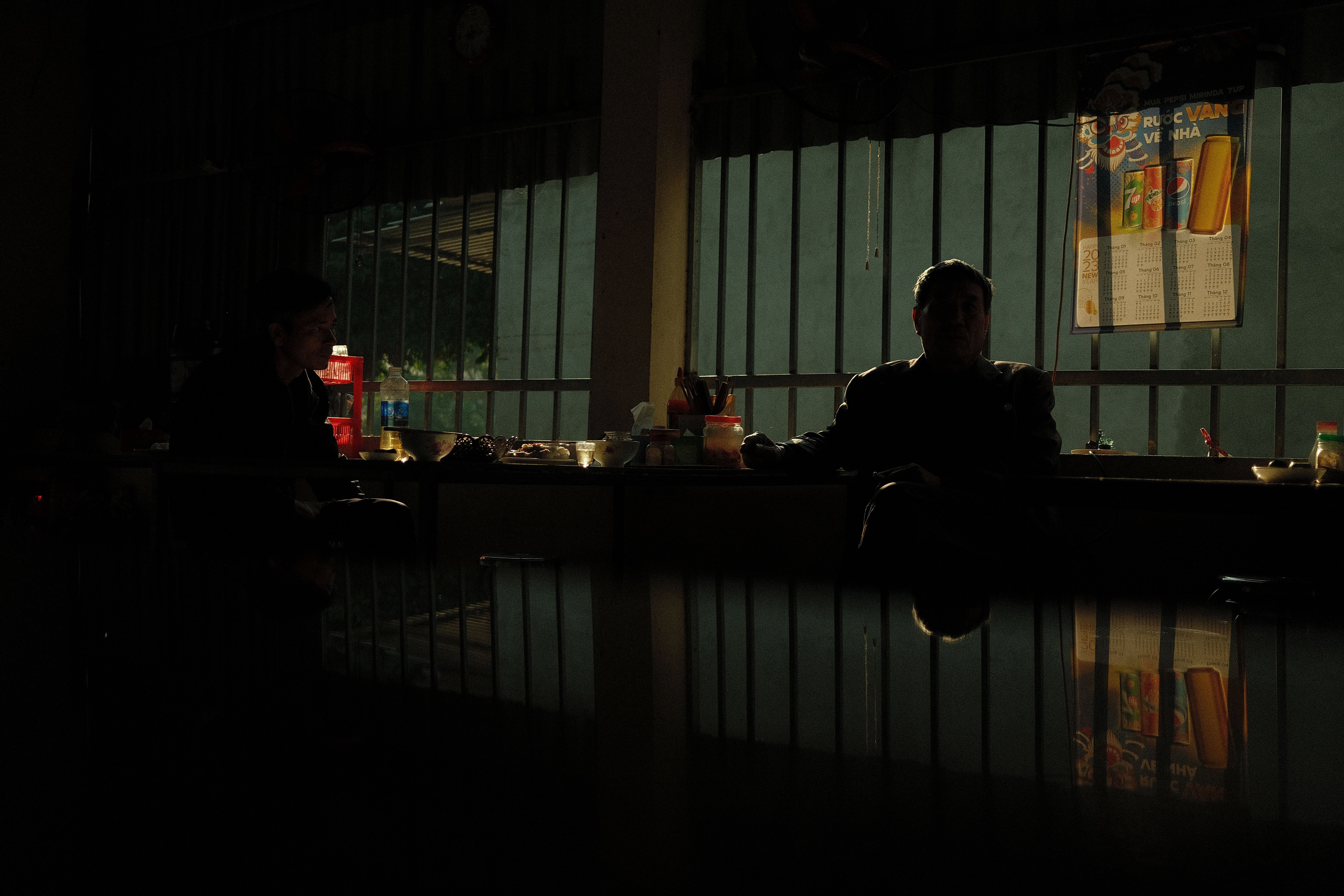 People Walking in Darkness in Hall · Free Stock Photo