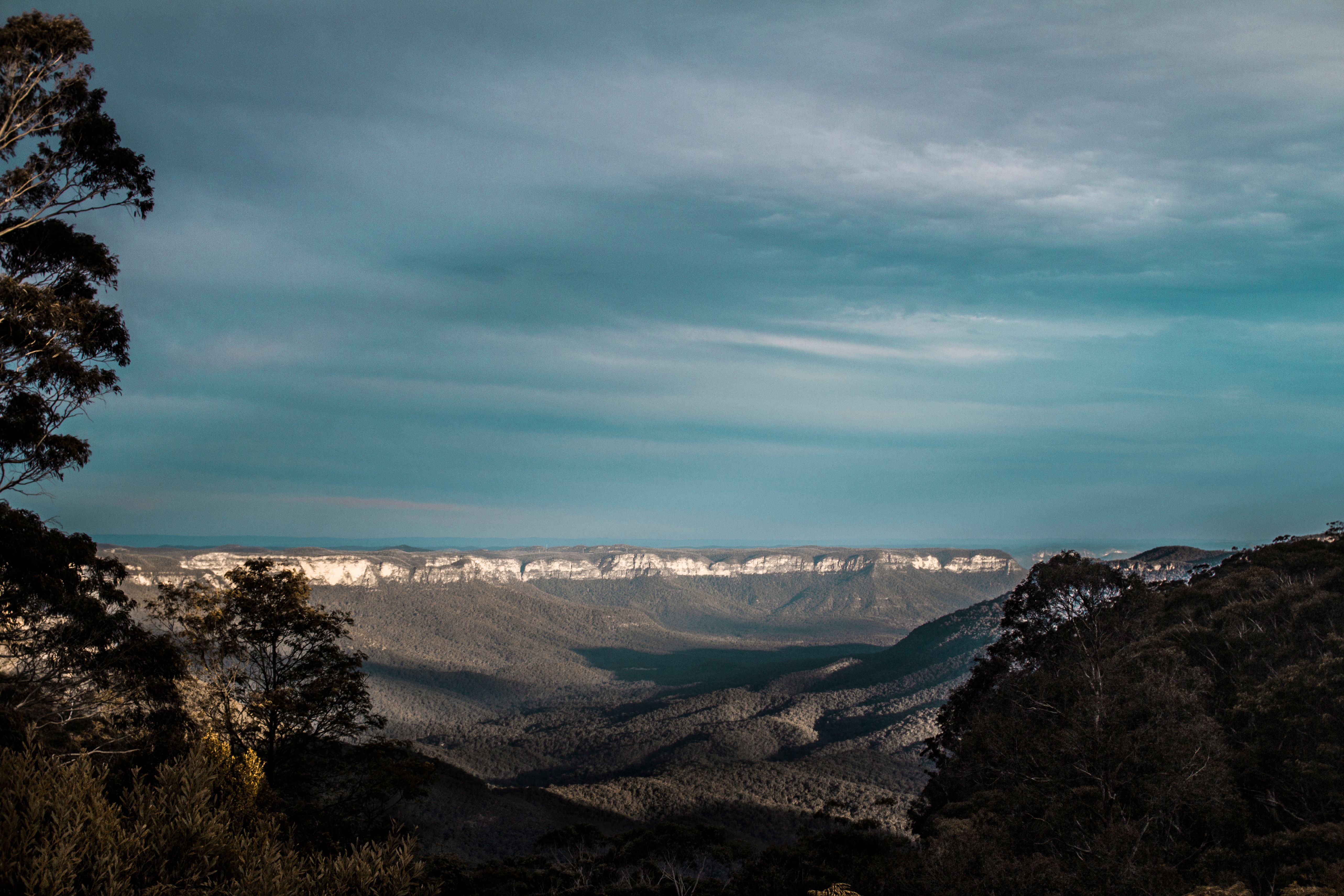 Clouds over Valley with Forest · Free Stock Photo