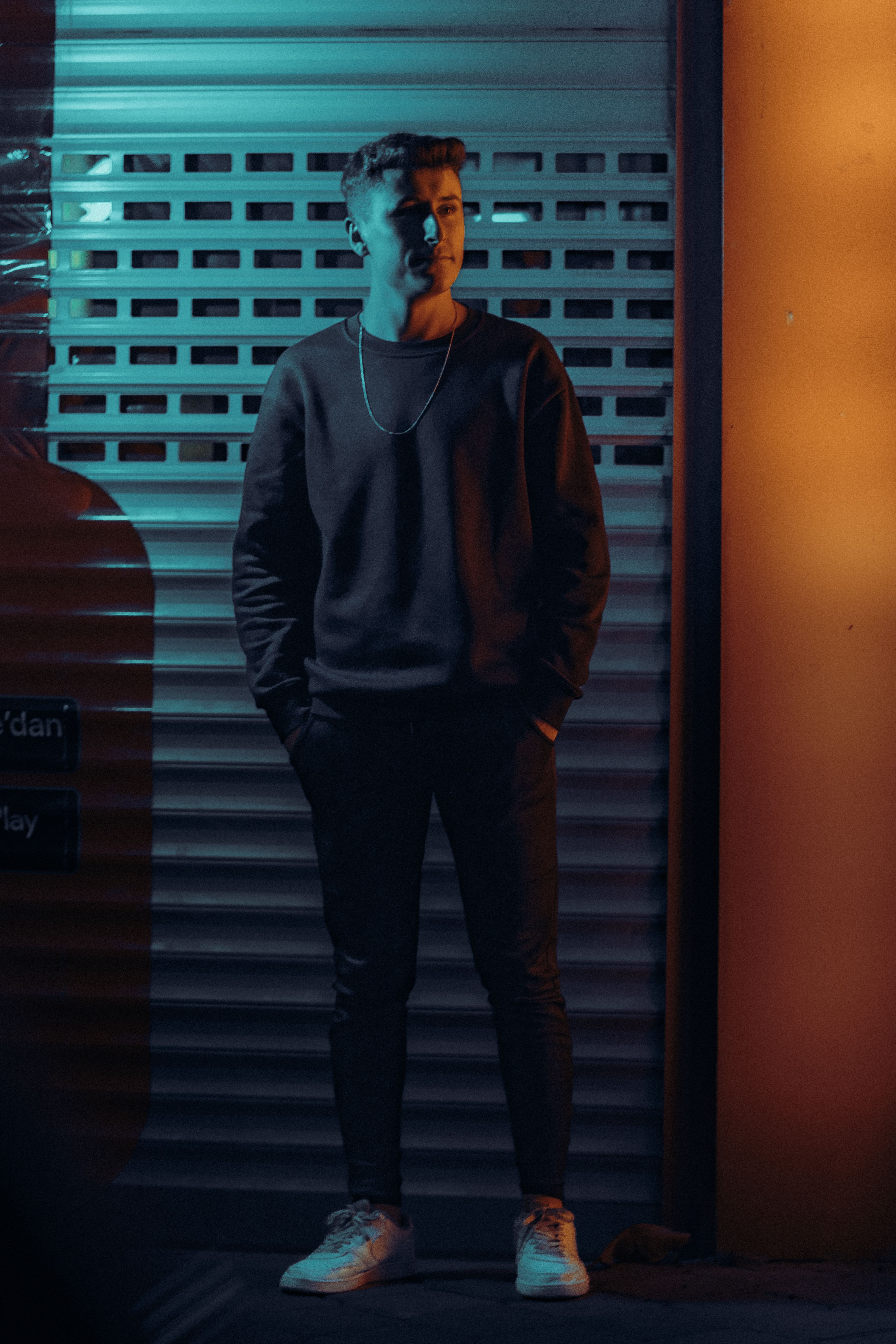 Man Standing near Wall · Free Stock Photo