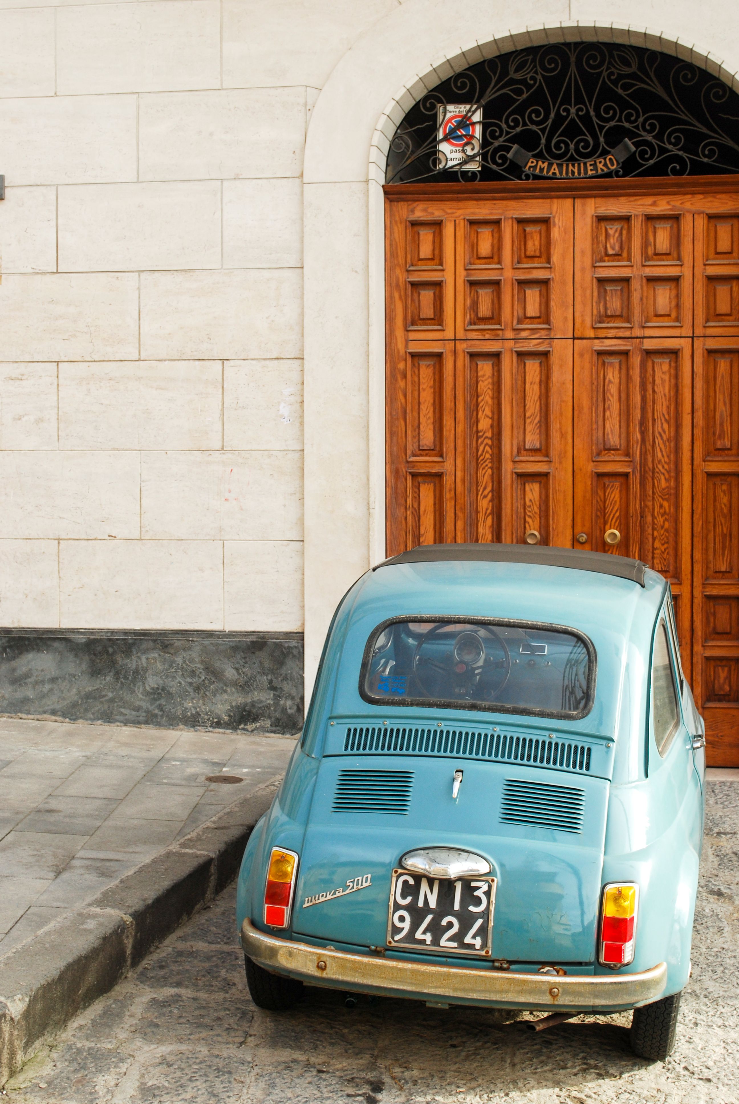 Vintage Car in front of Building · Free Stock Photo