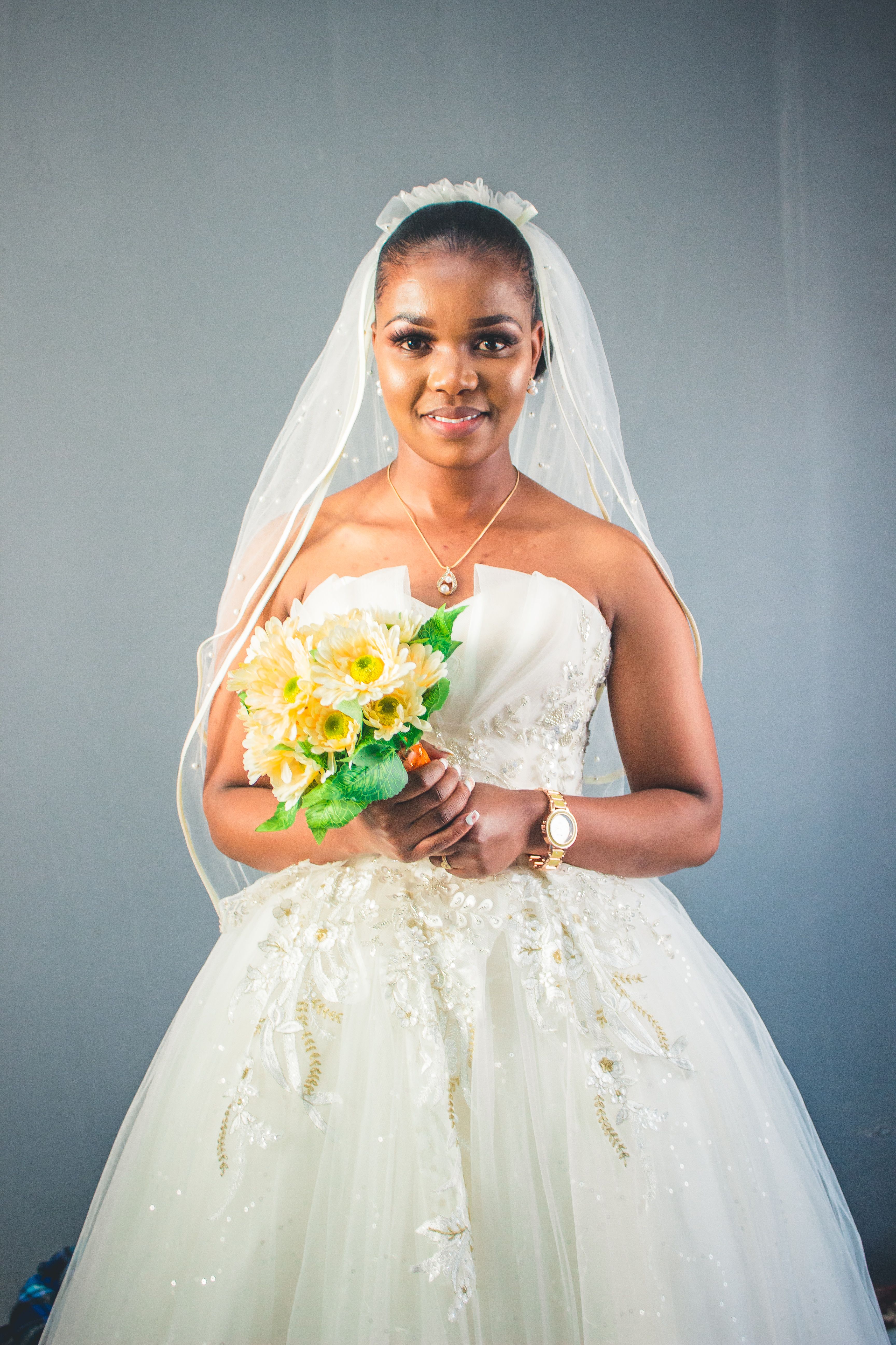 A Beautiful Bride in Her Wedding Gown · Free Stock Photo