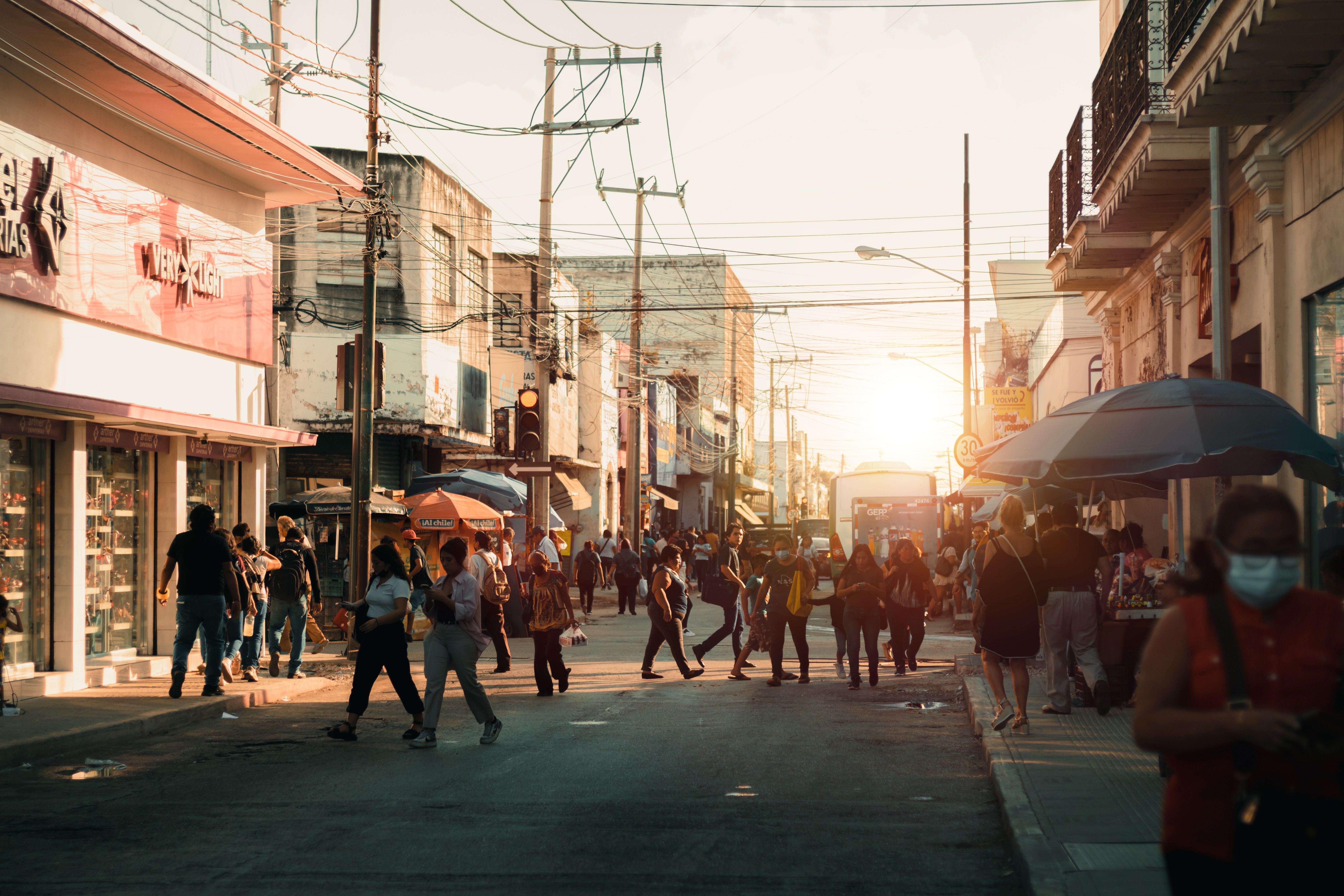 People Walking on City Street on Sunset · Free Stock Photo