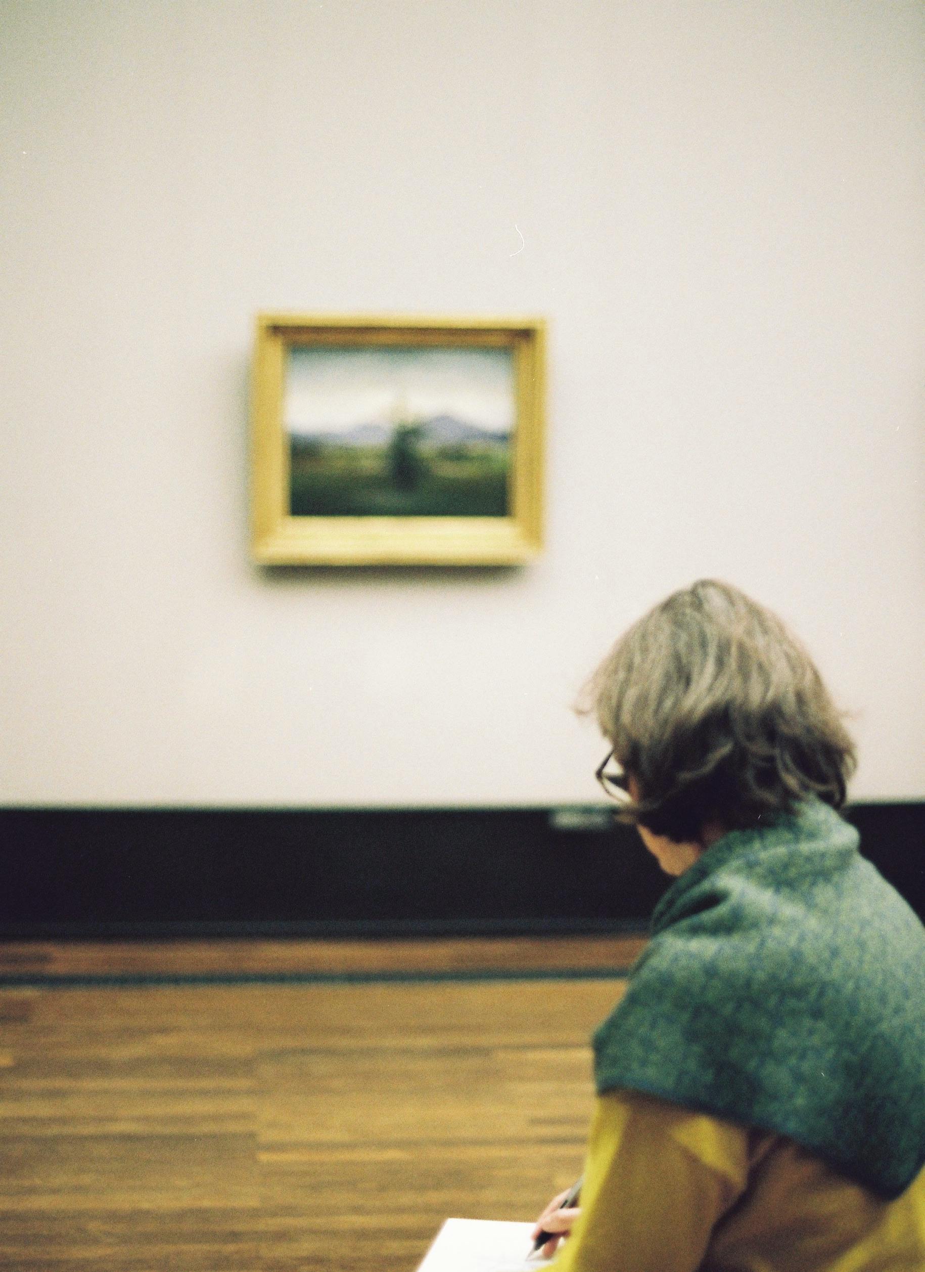 Old Woman Walking in Doors with Stained Glass Windows · Free Stock Photo