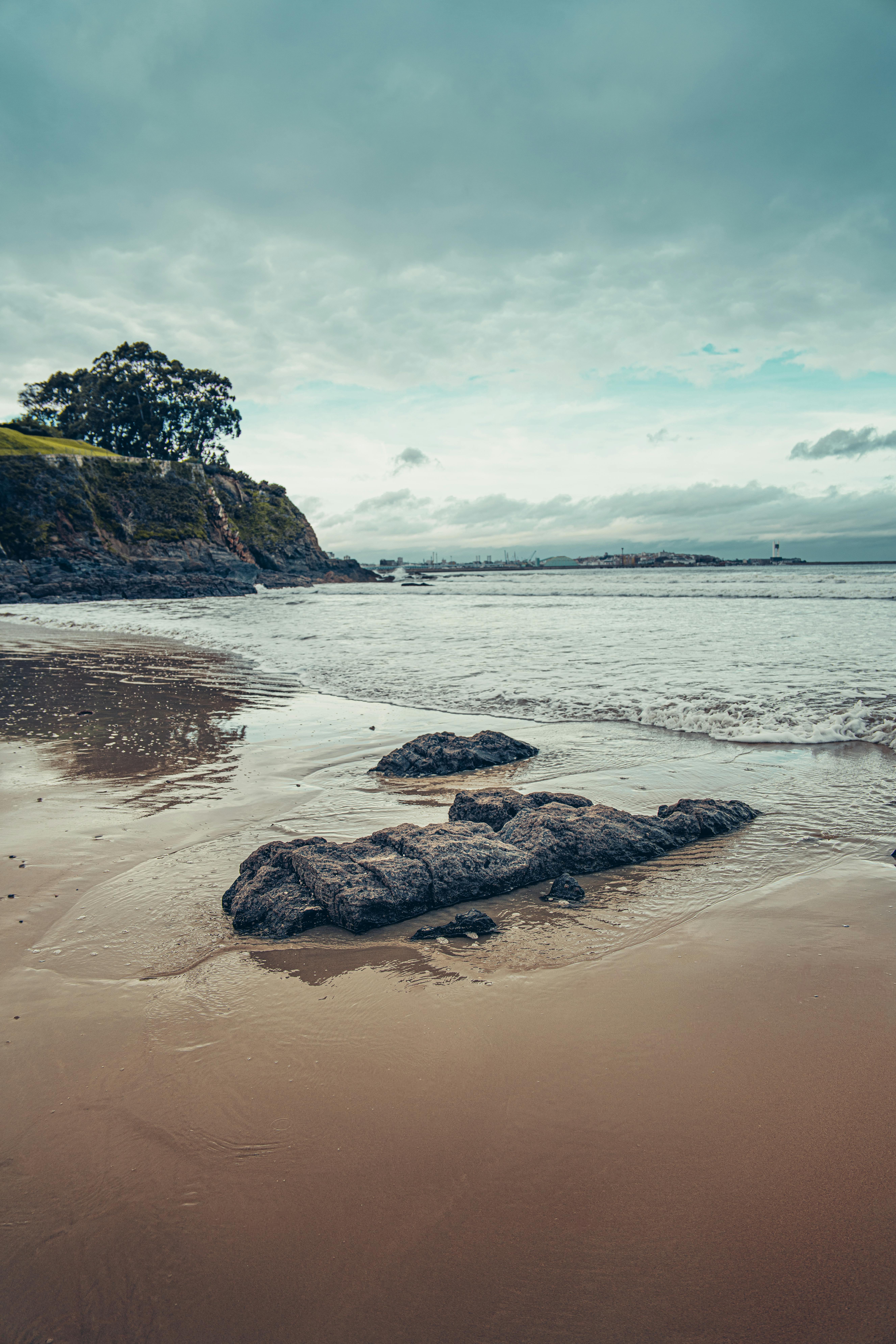 Rocks on Sandy Beach · Free Stock Photo