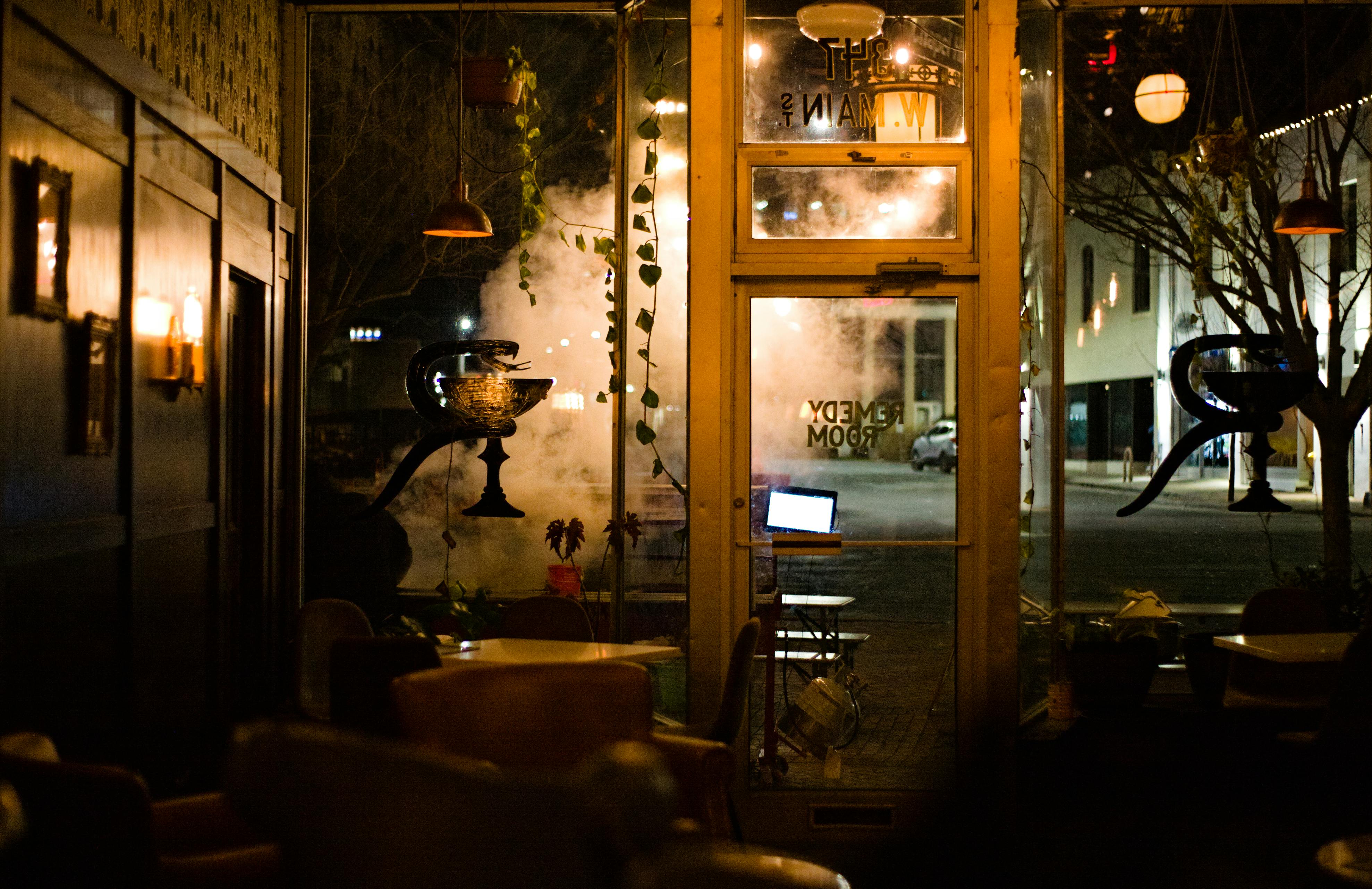 Interior of an Empty Cafe in City at Night · Free Stock Photo