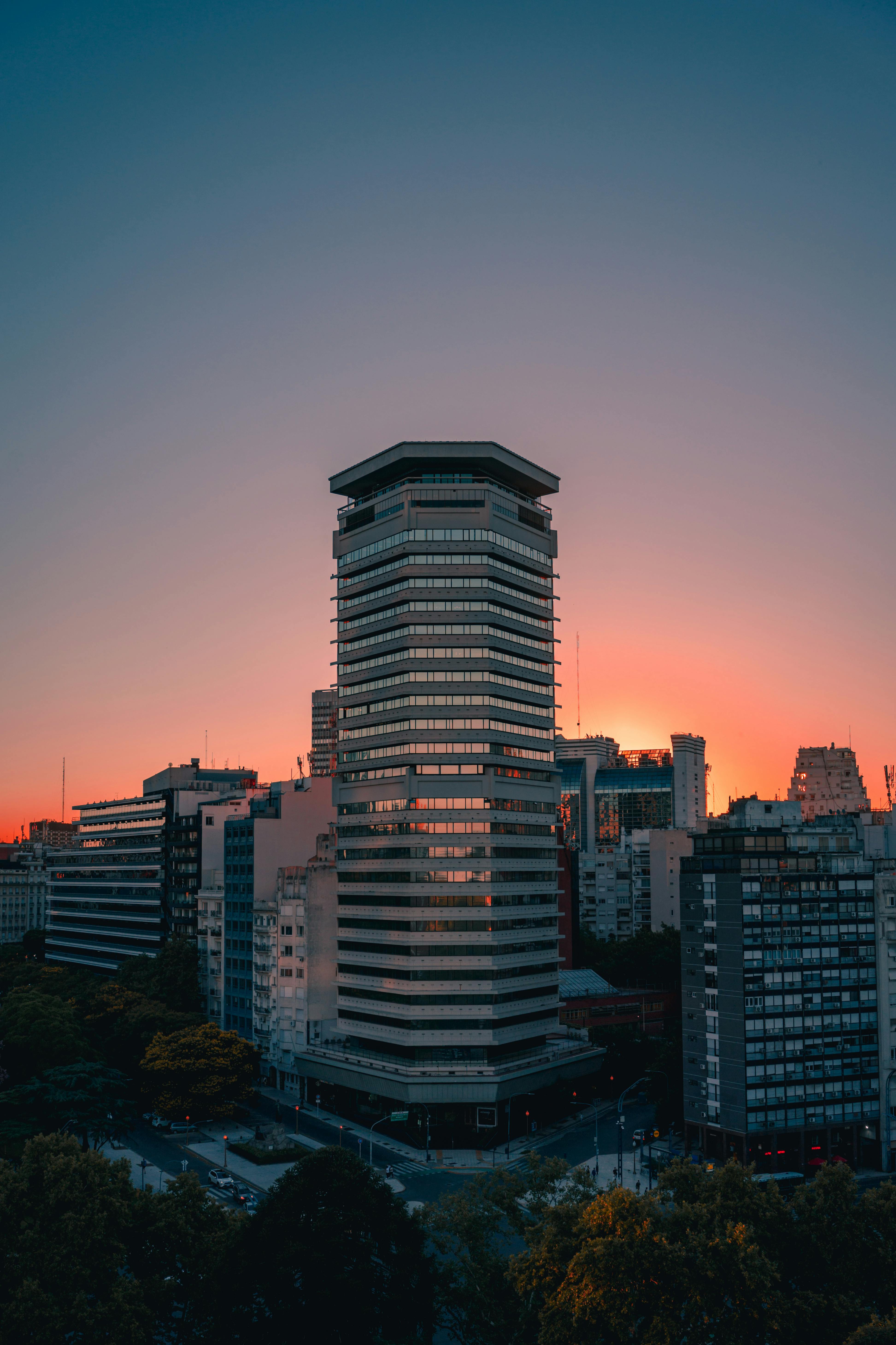 City With High Rise Buildings Under Cloudy Sky during Sunset · Free ...