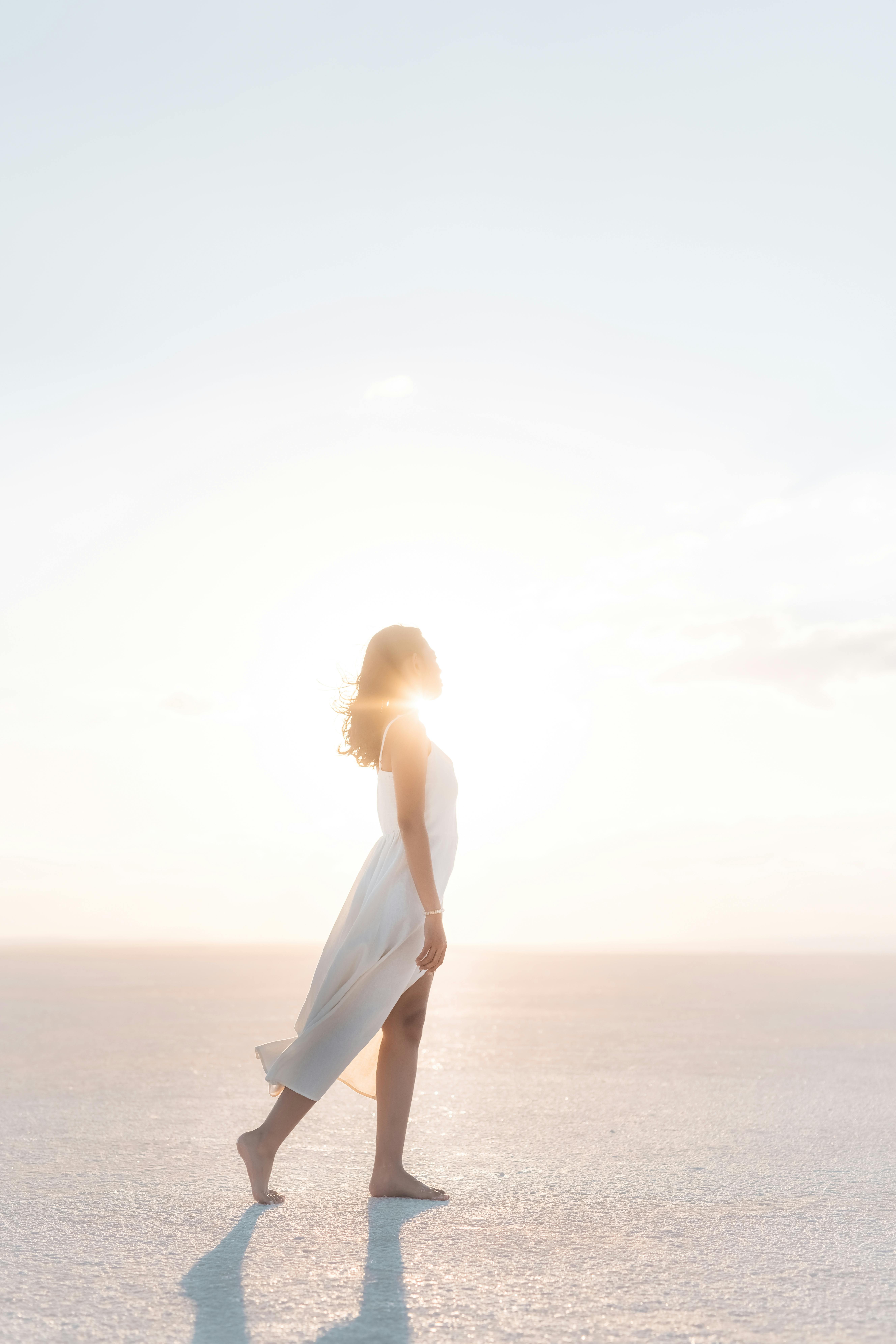 Sunlight behind Woman in Dress · Free Stock Photo