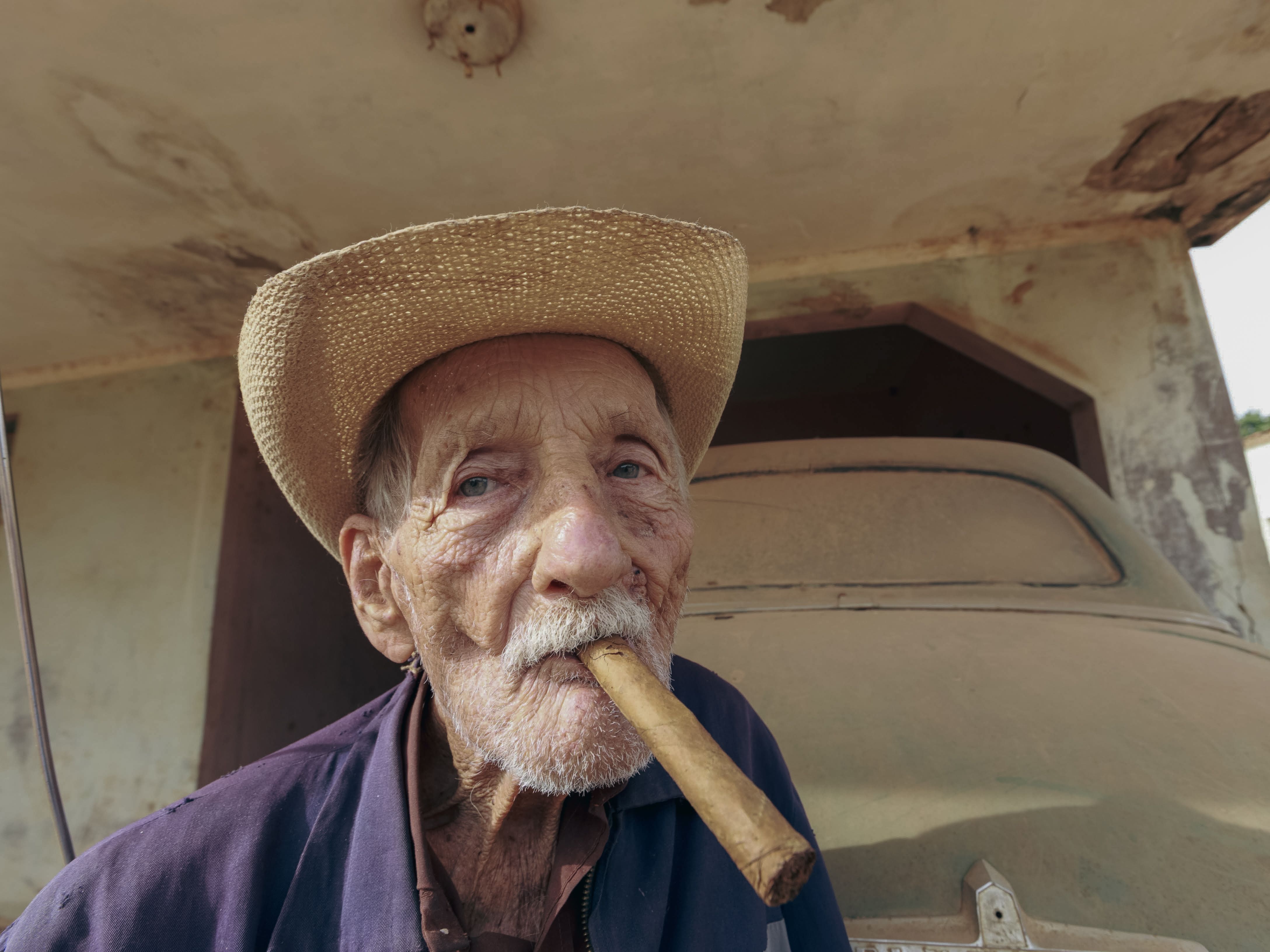 Portrait of Man Smoking Cigar · Free Stock Photo