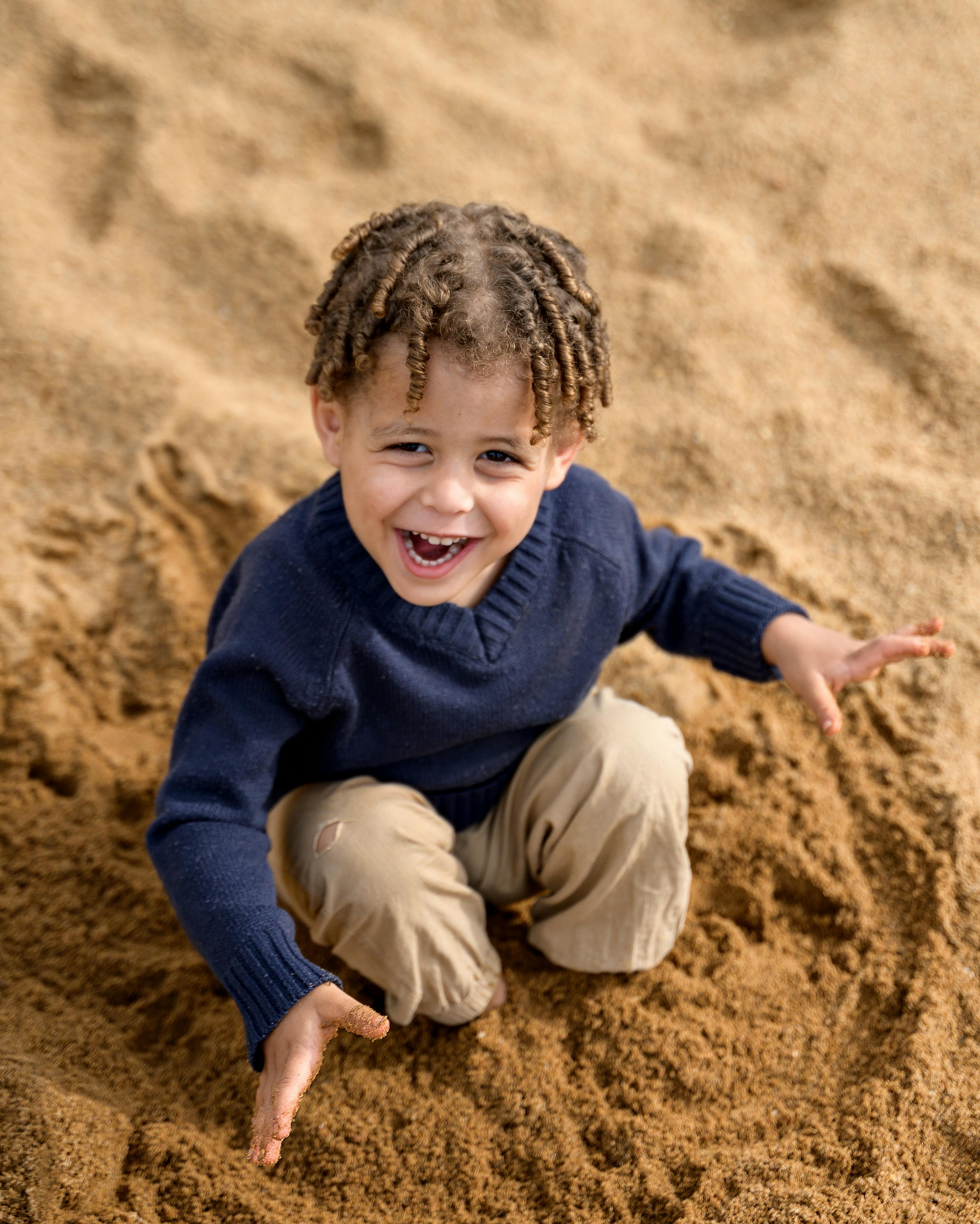 Boy Playing in Sand · Free Stock Photo