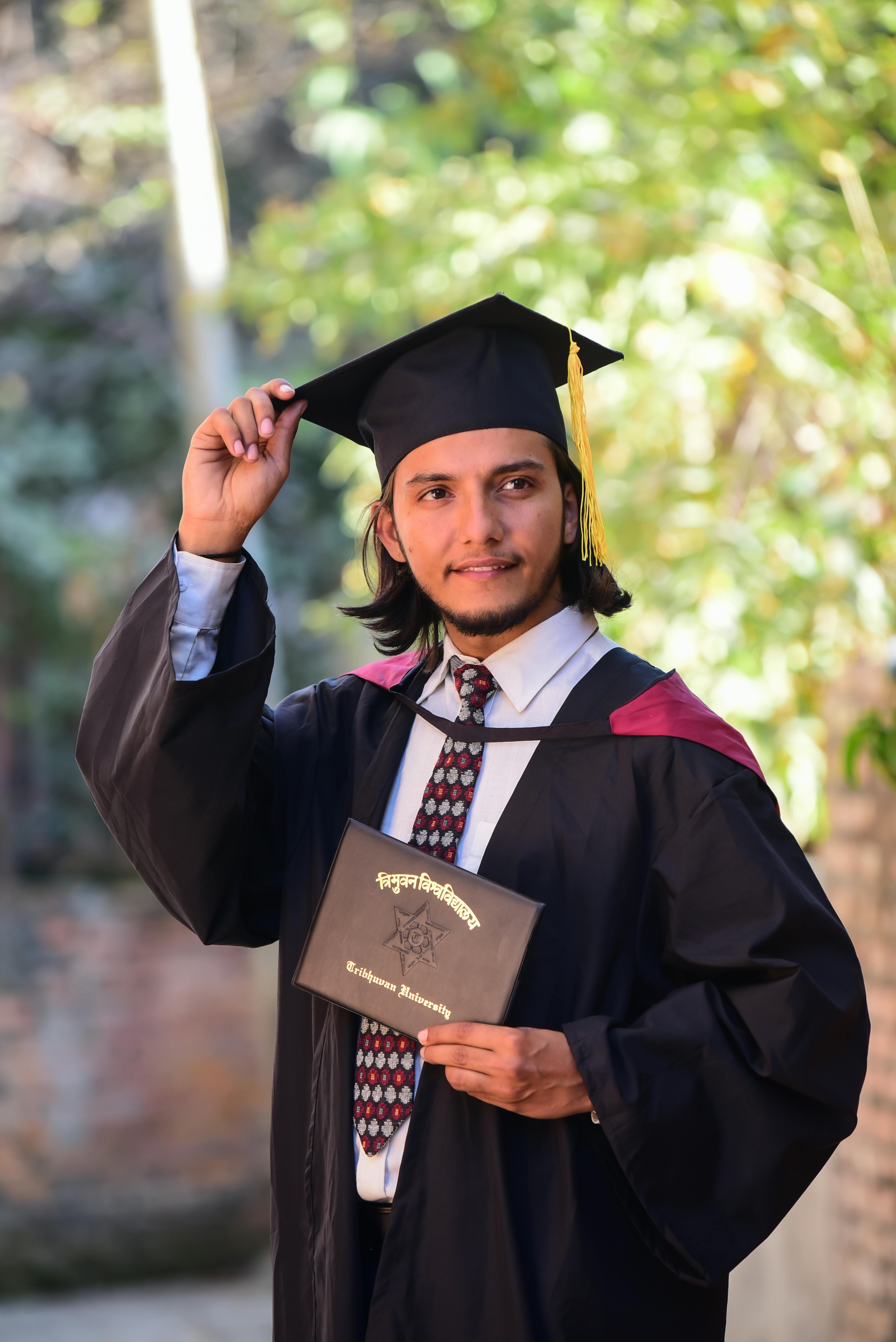Man in Gown After Graduation · Free Stock Photo